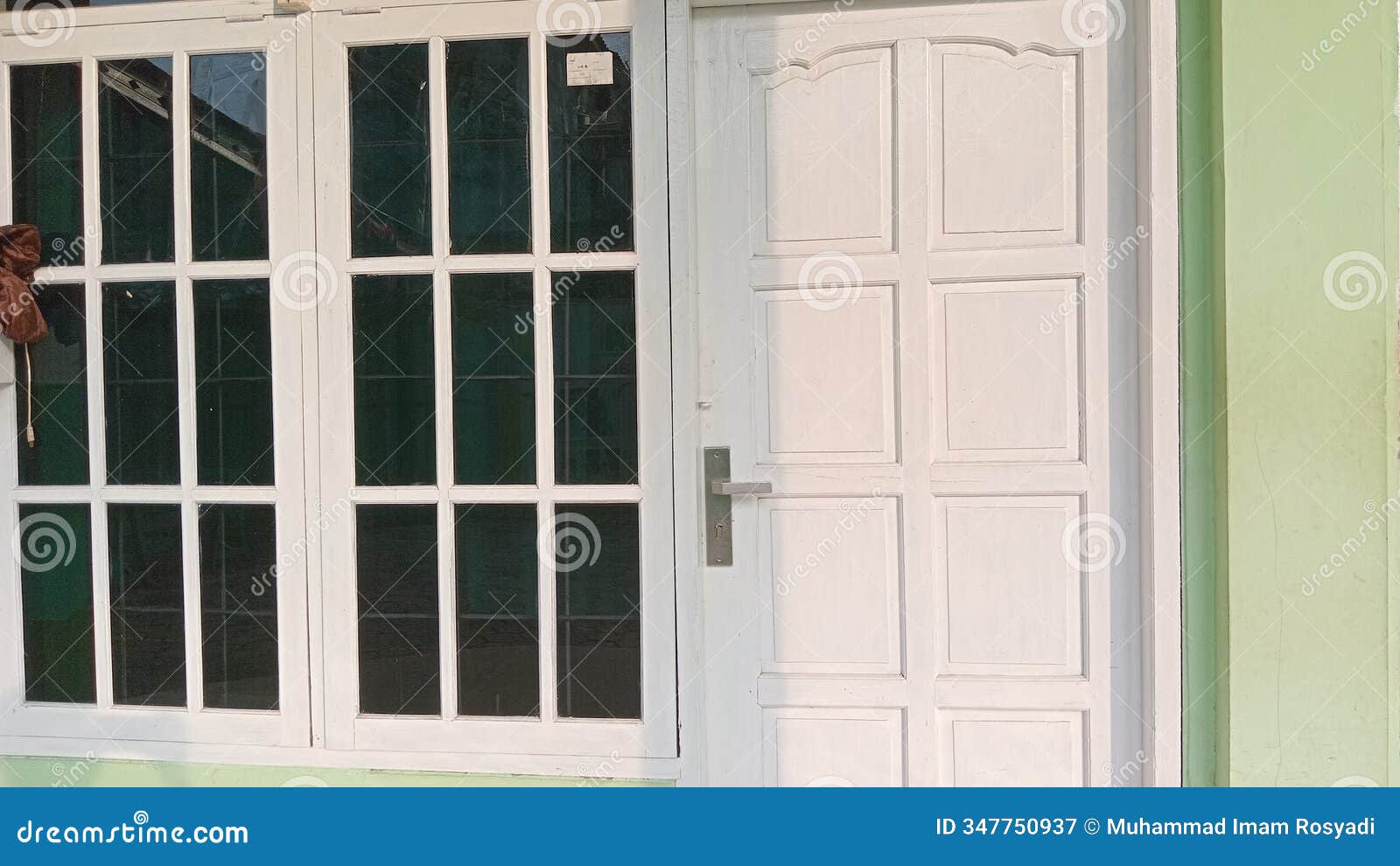 Windows and Doors with White Paint in a Simple Building Stock Image ...