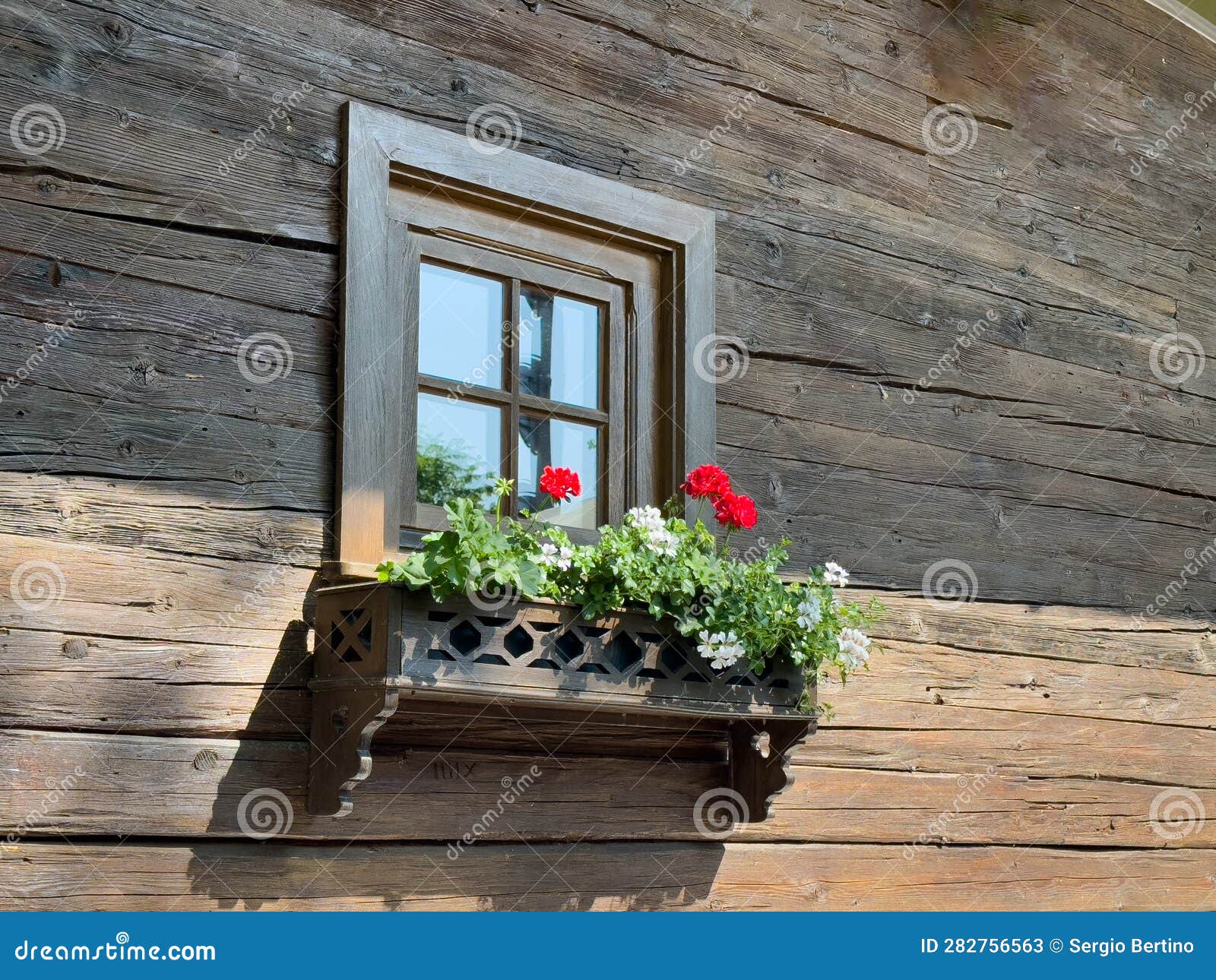 Windows with Flowers on a Bavarian House External Wall Stock Image ...