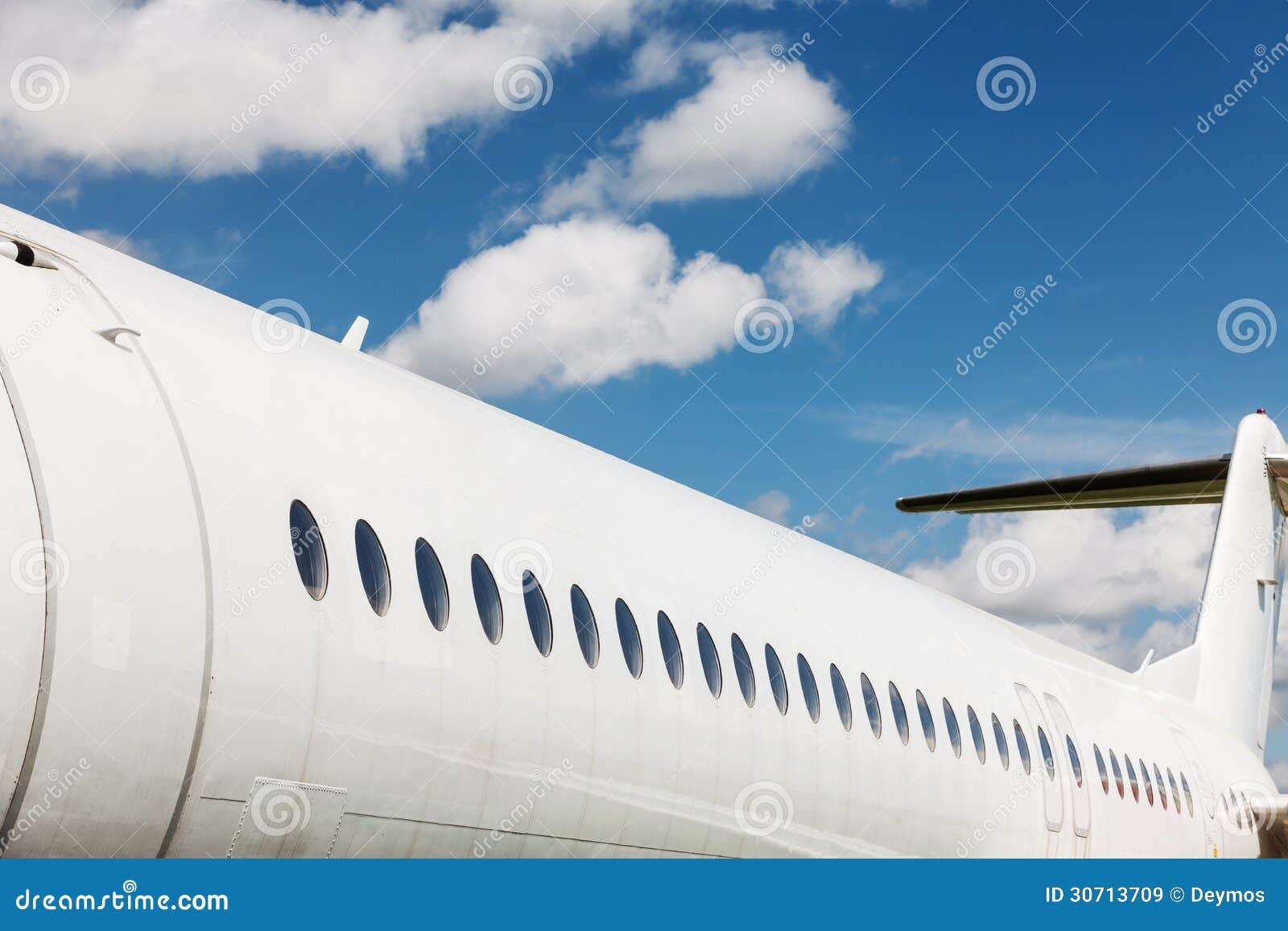 Fuselage Of Airplane With Door And Windows. Row Of Portholes Outside ...