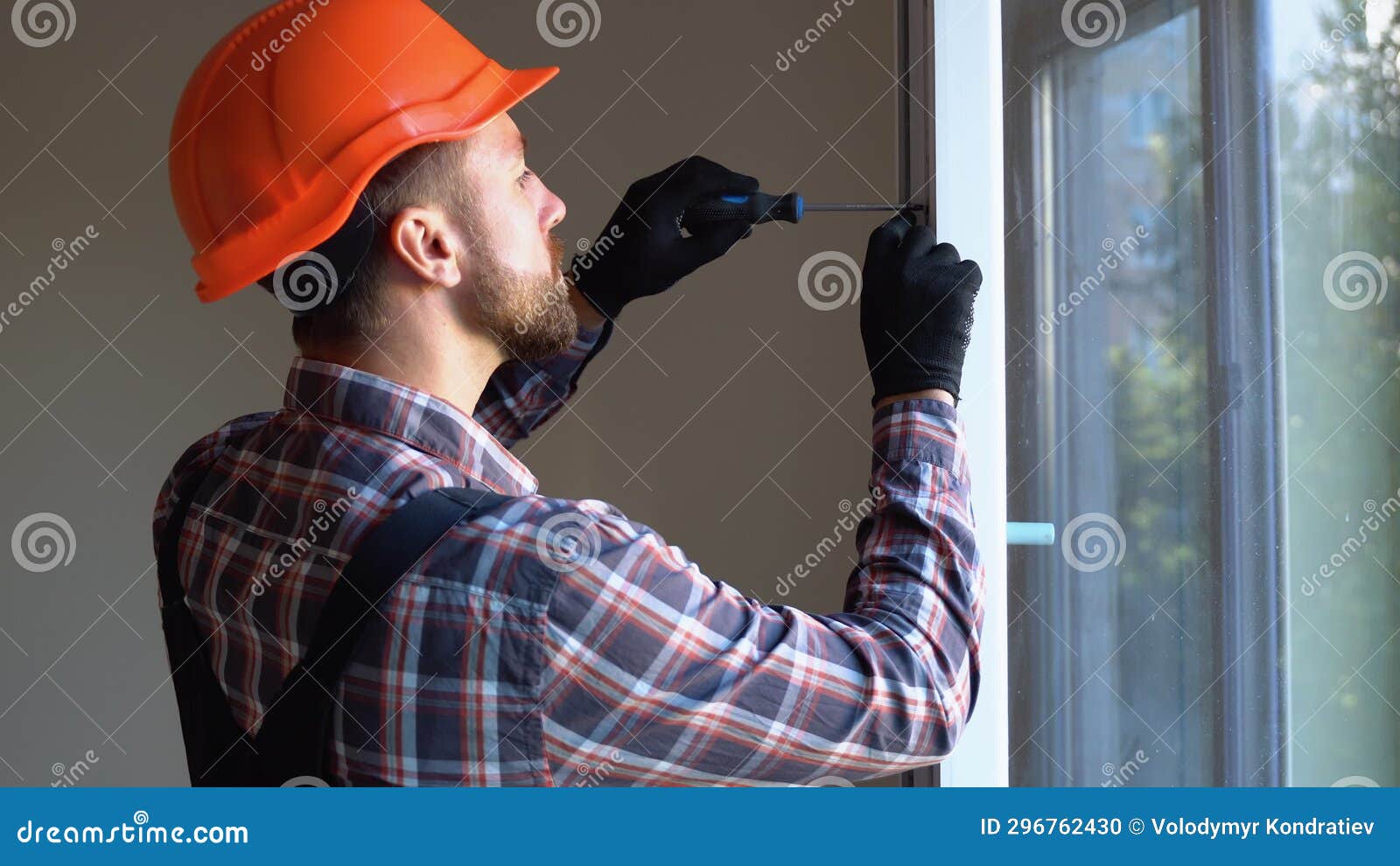 Windows Installation Worker Installing and Checking Window in the House ...