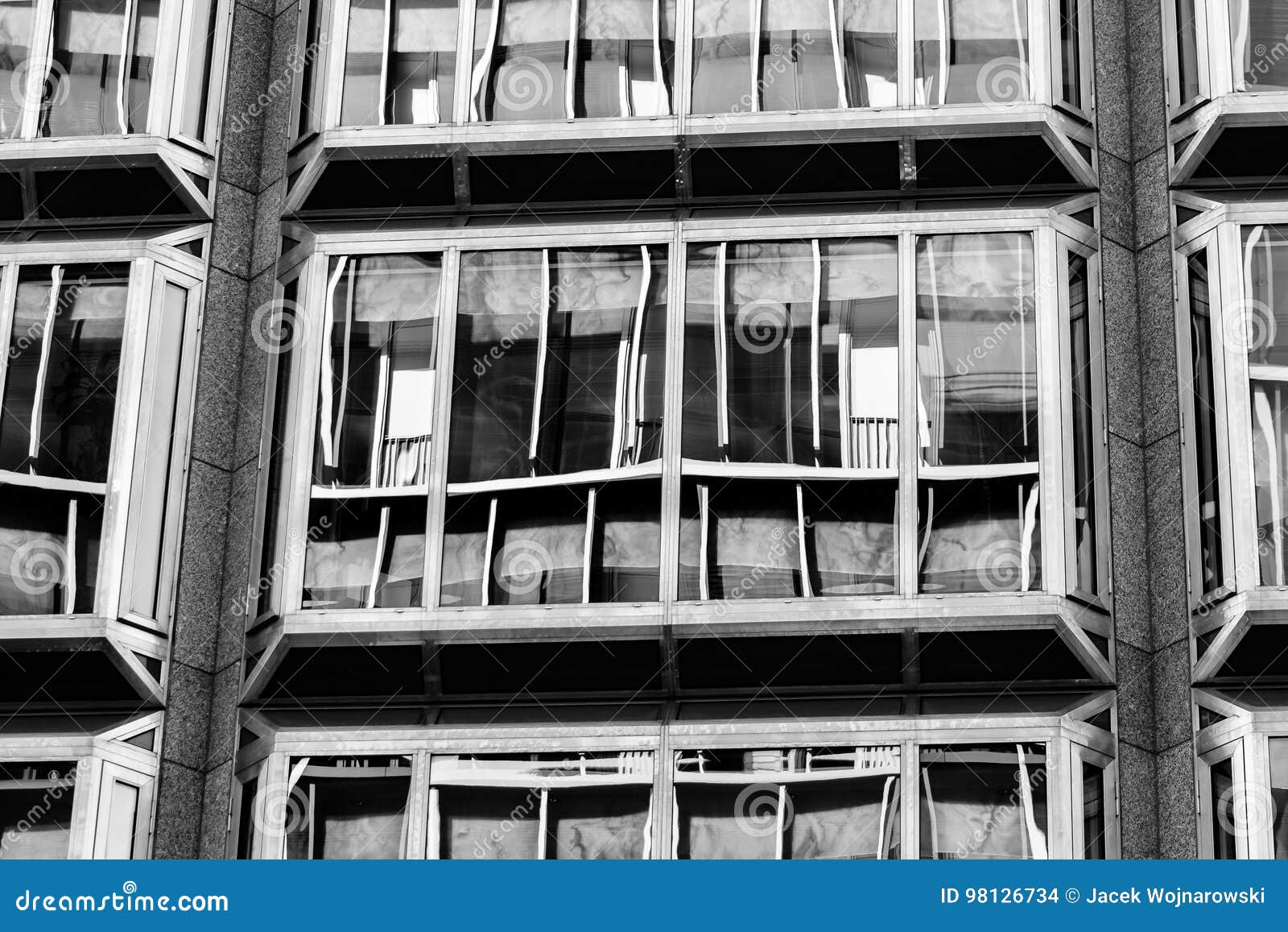 Windows on a Multi-Storey Building Showing Reflections BW Stock Photo ...
