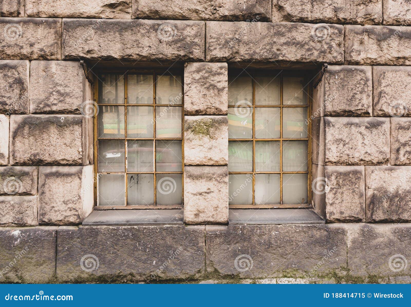 Windows on an Old Block Wall Stock Image - Image of facade, stone ...
