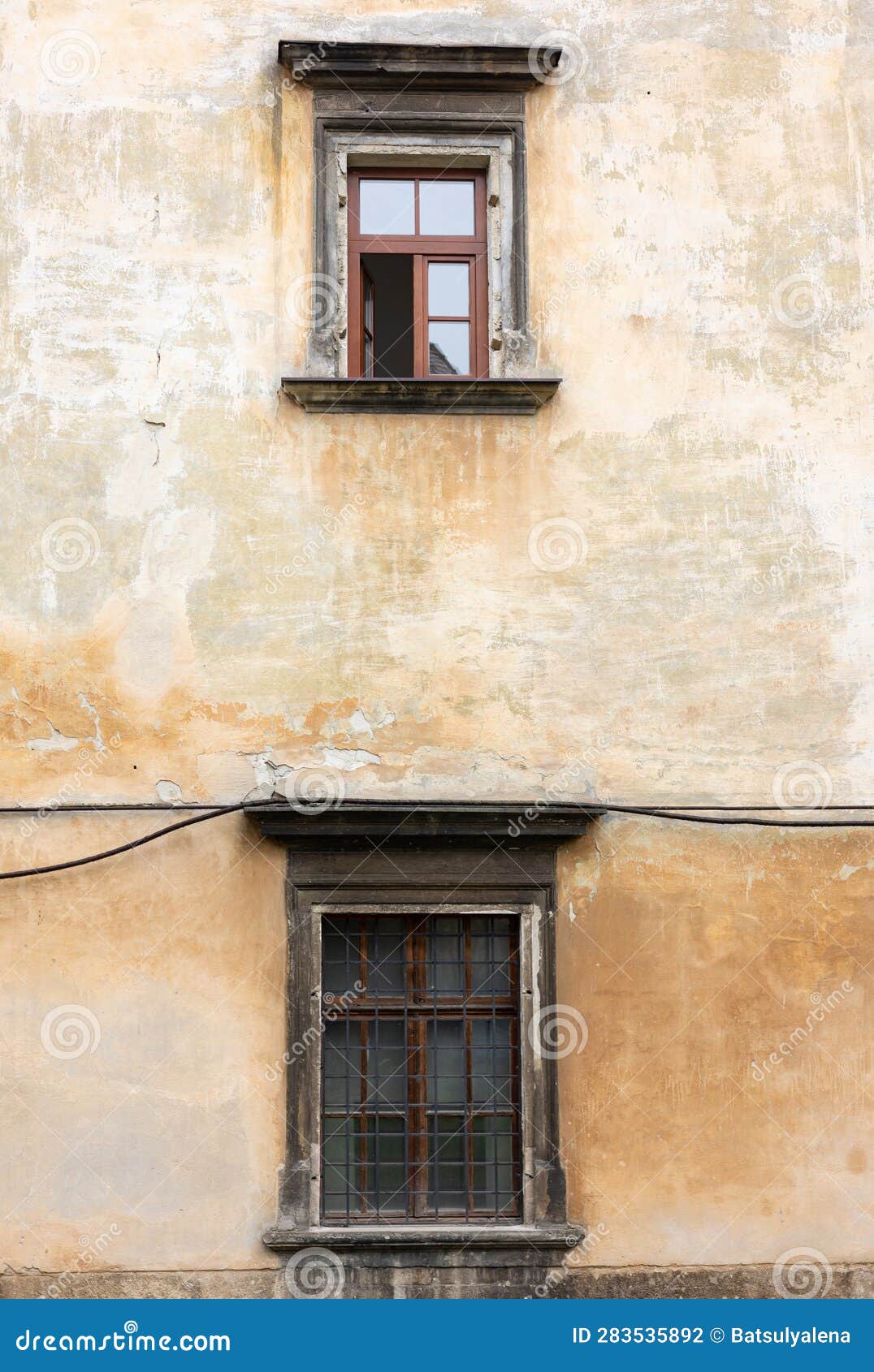 Windows on an old building stock photo. Image of home - 283535892