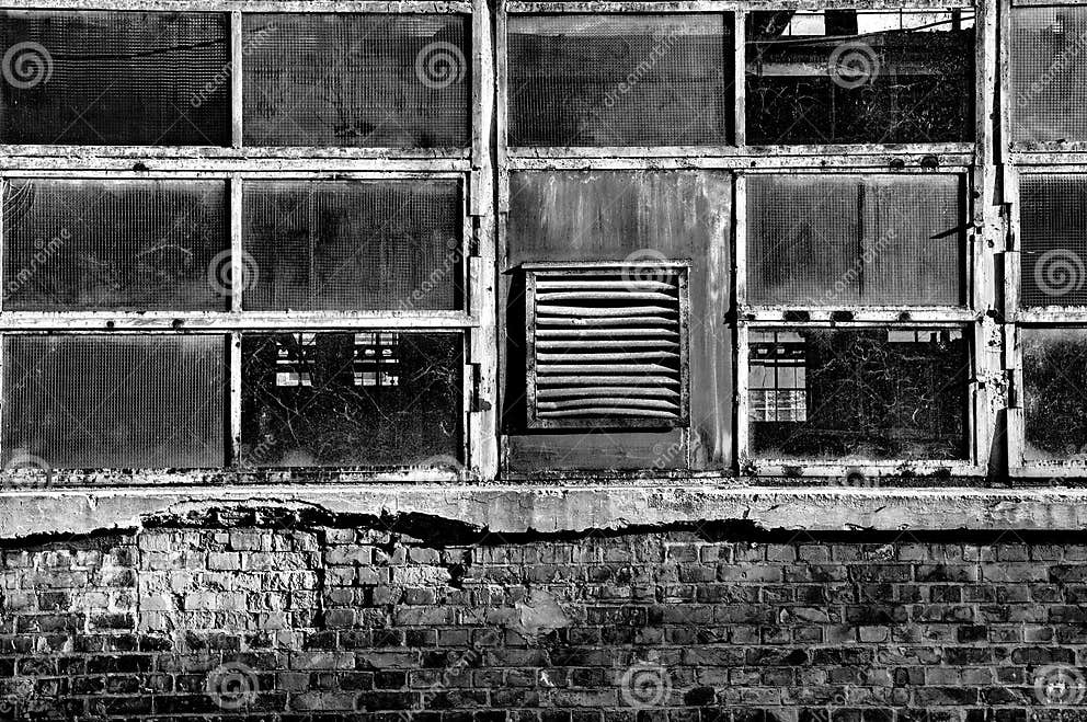 Windows of an old factory stock photo. Image of exterior - 32614206
