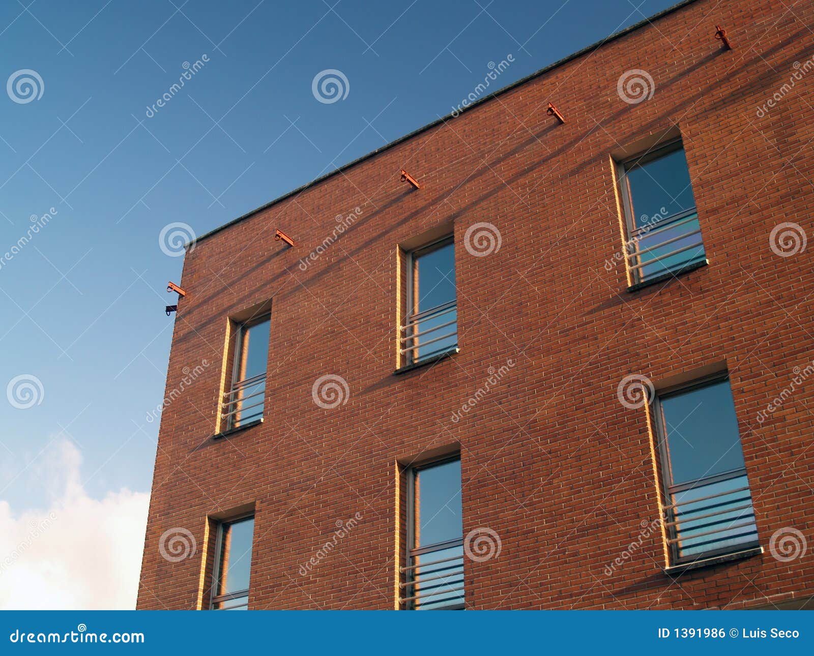 Windows reflecting sky stock photo. Image of array, roof - 1391986
