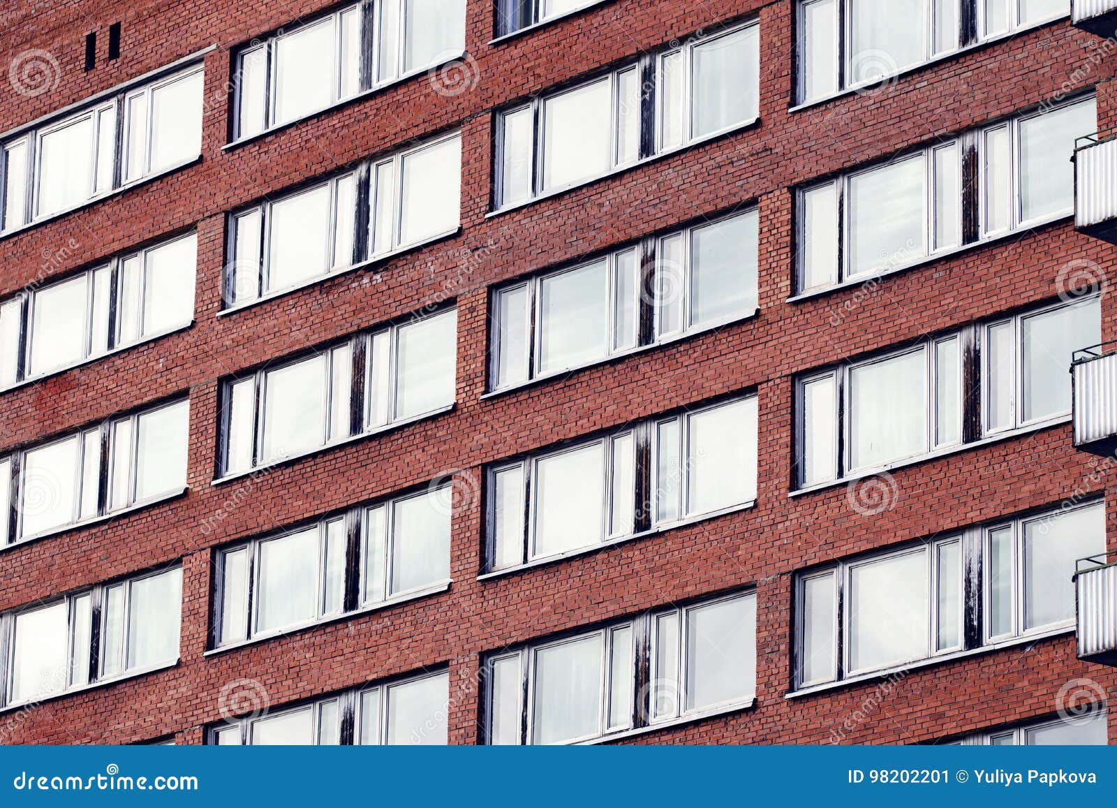 Windows with Reflection in Bricks Building. Stock Image - Image of ...