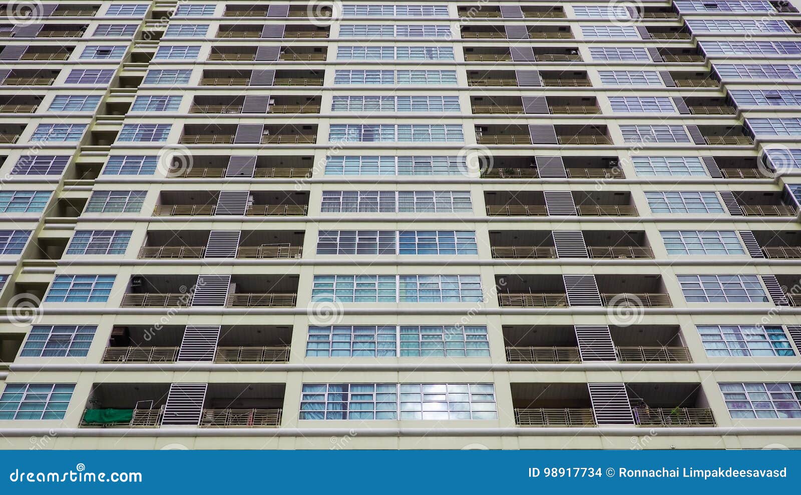 Windows in Row on Facade of Apartment Building Stock Photo - Image of ...