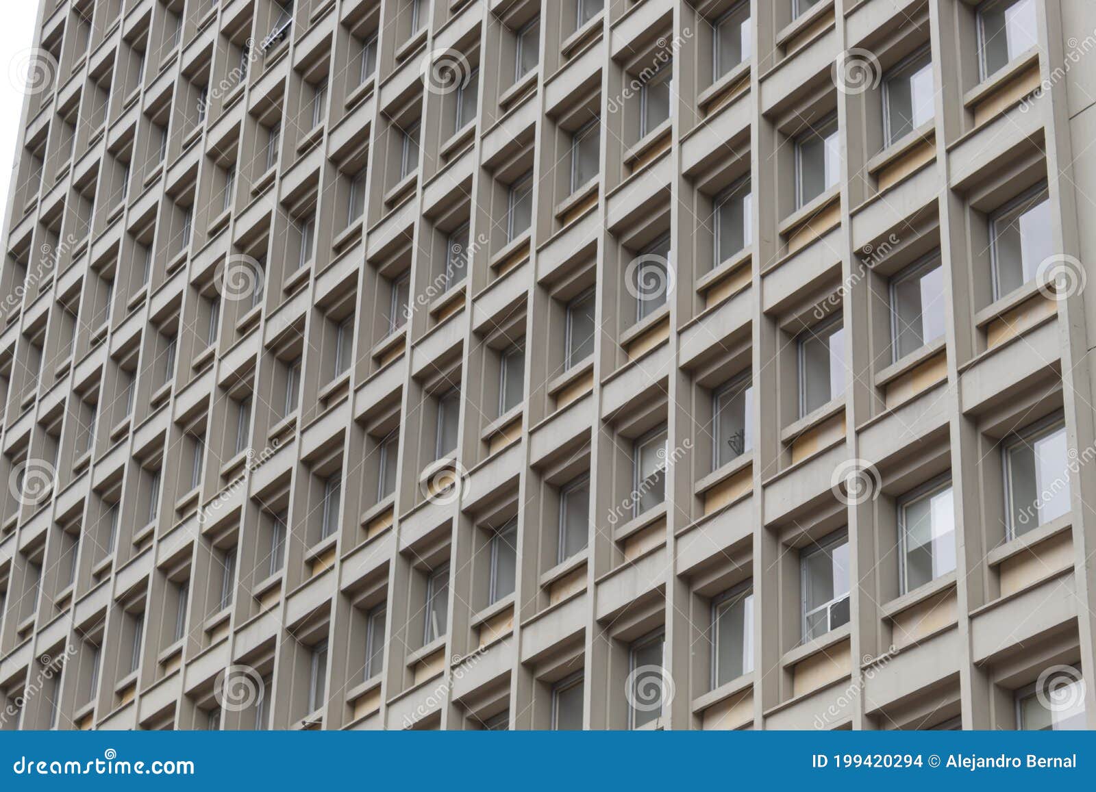 Windows and Square Patterns of an Old Skyscraper Stock Photo - Image of ...