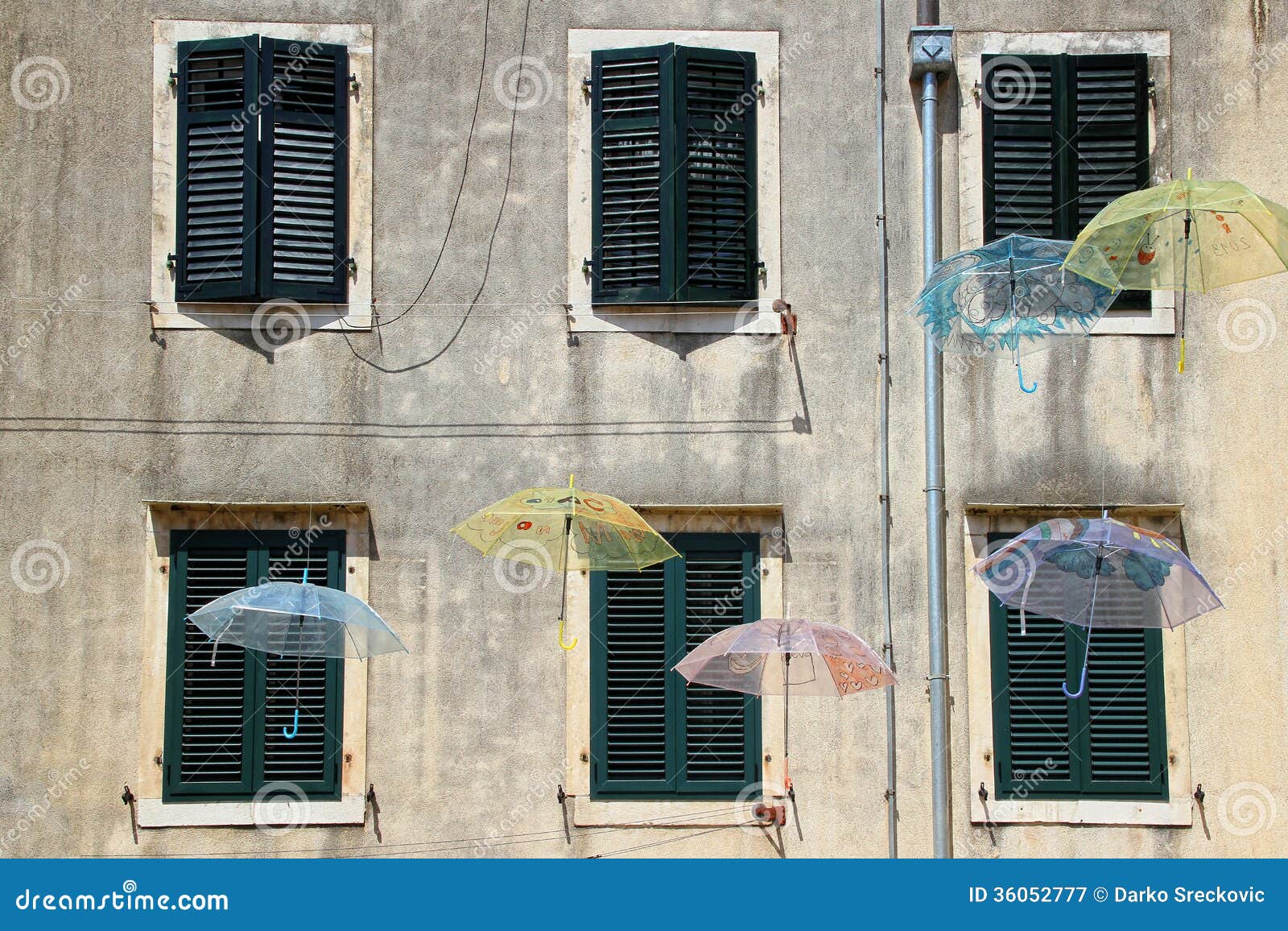 Windows and umbrellas stock image. Image of umbrella - 36052777