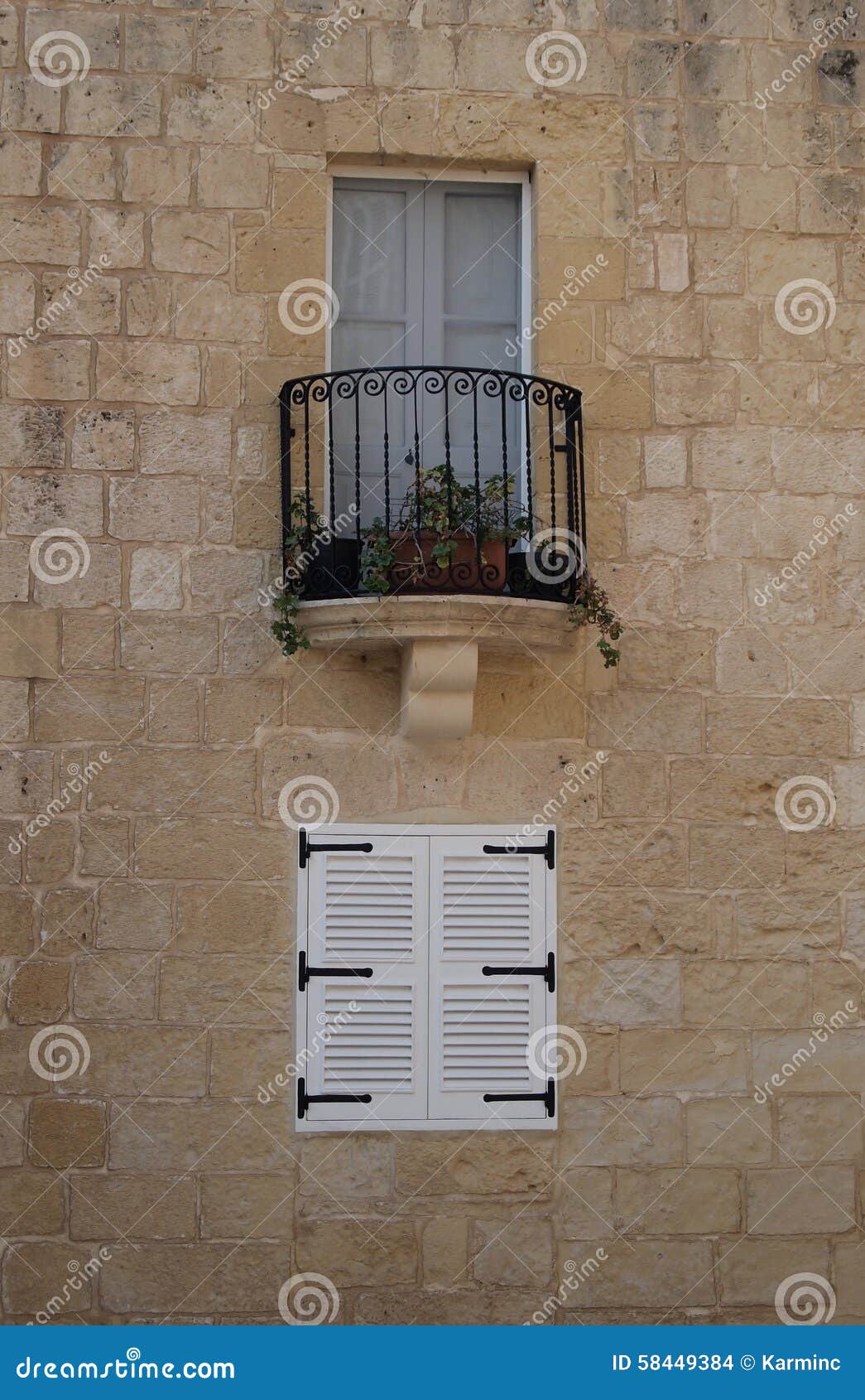 Windows on a wall in Malta stock photo. Image of railing - 58449384