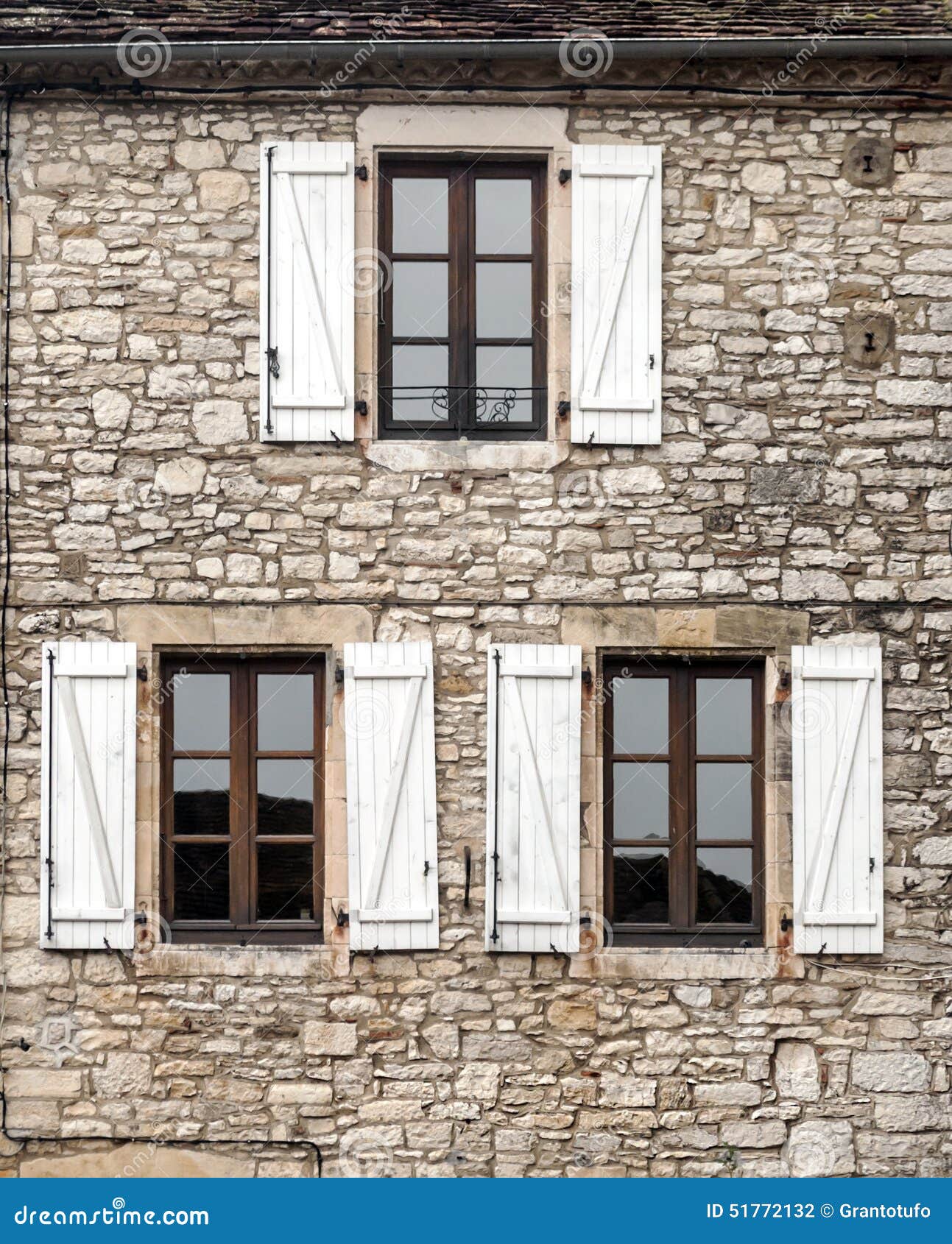 Windows on wall stone stock photo. Image of background - 51772132