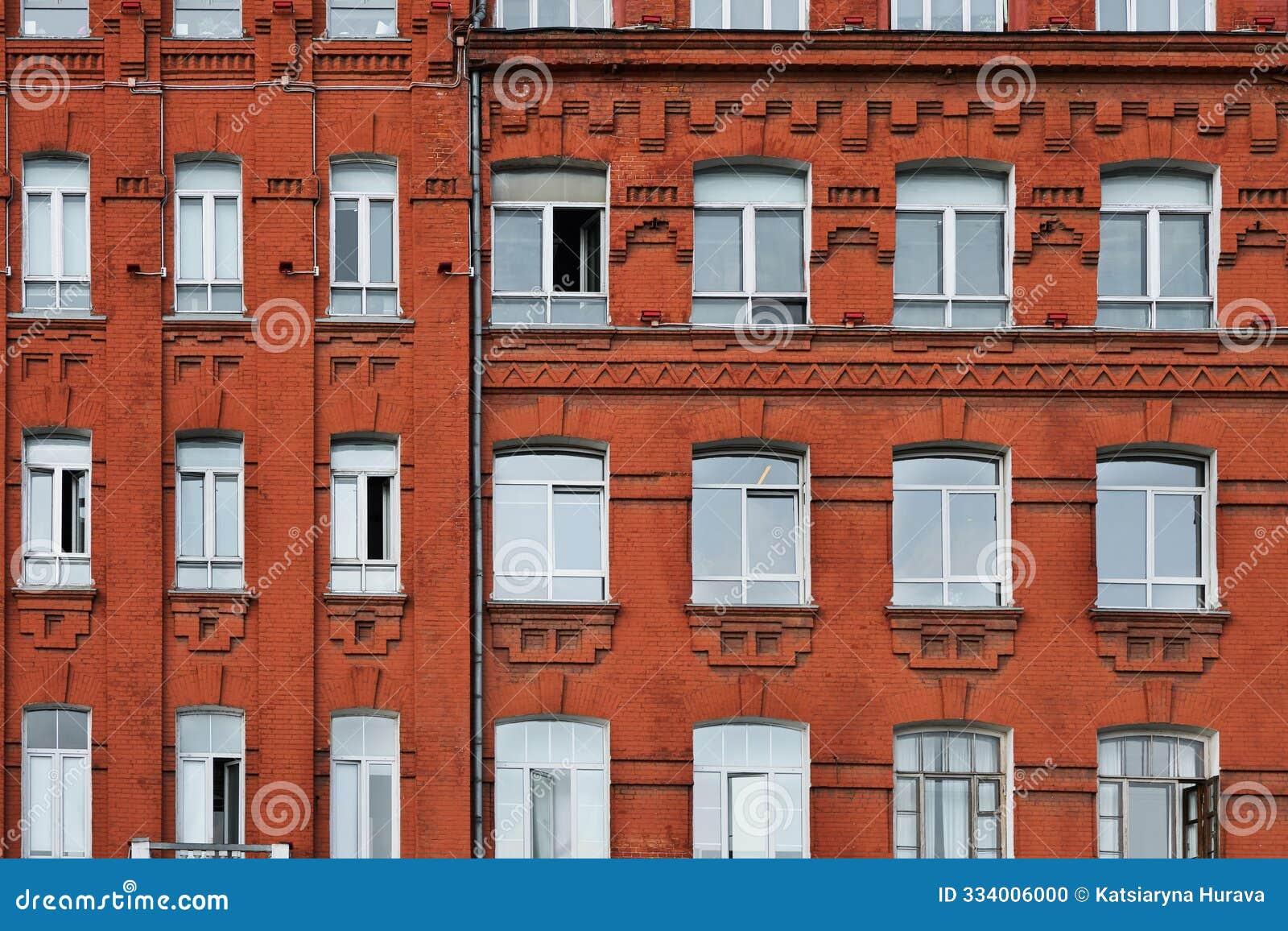 Windows with White Frame on Red Brick Wall. Exterior Front Street View ...