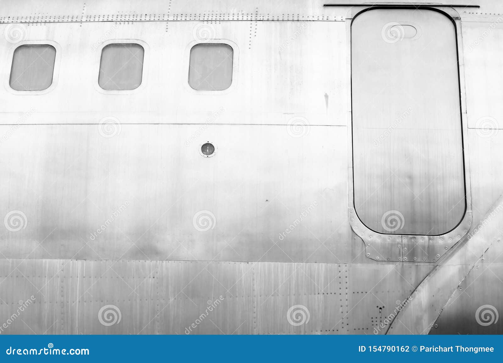 Windows of the White Metal Surface Airplane with Emergency Exit ...