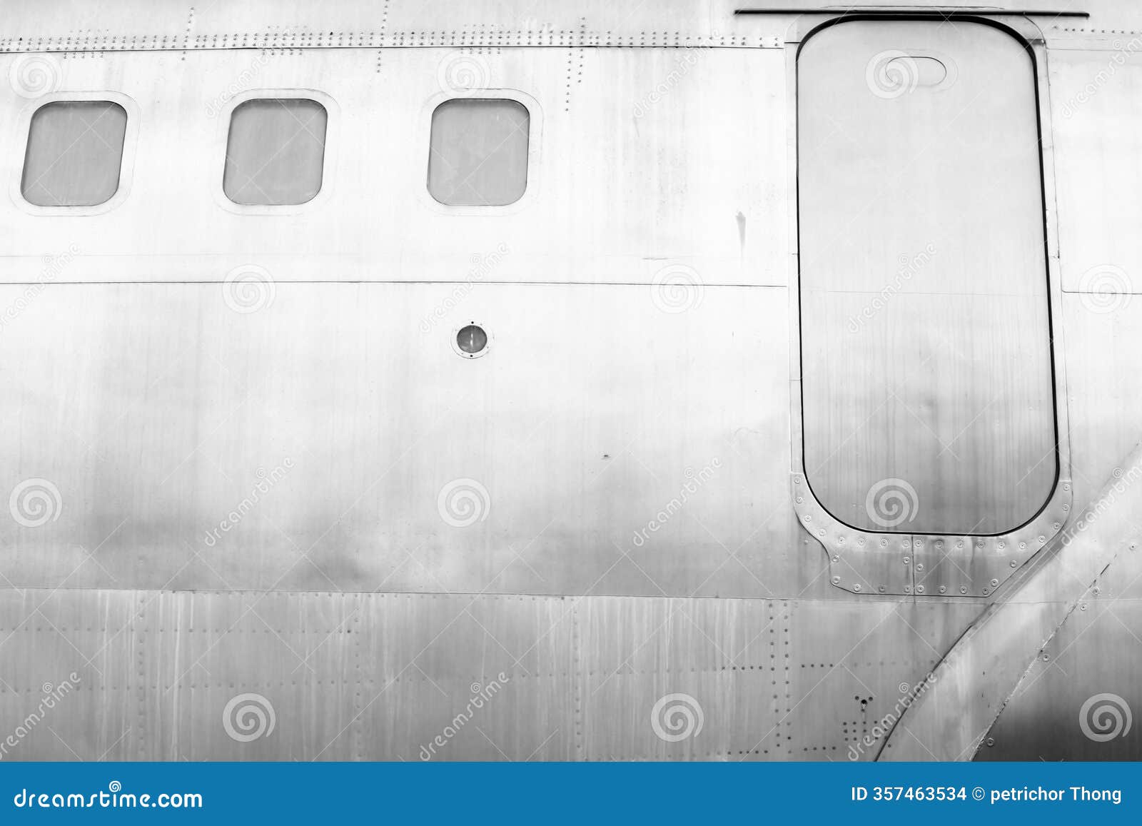 Windows of the White Metal Surface Airplane with Emergency Exit ...
