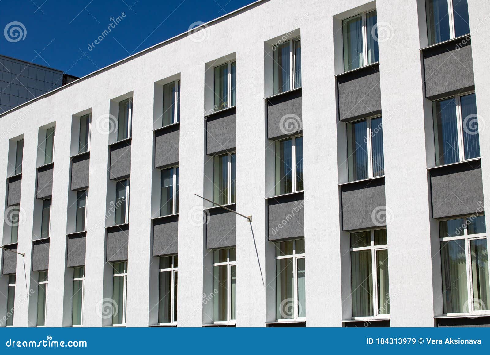 The Windows of the White Three-story Building Stock Image - Image of ...