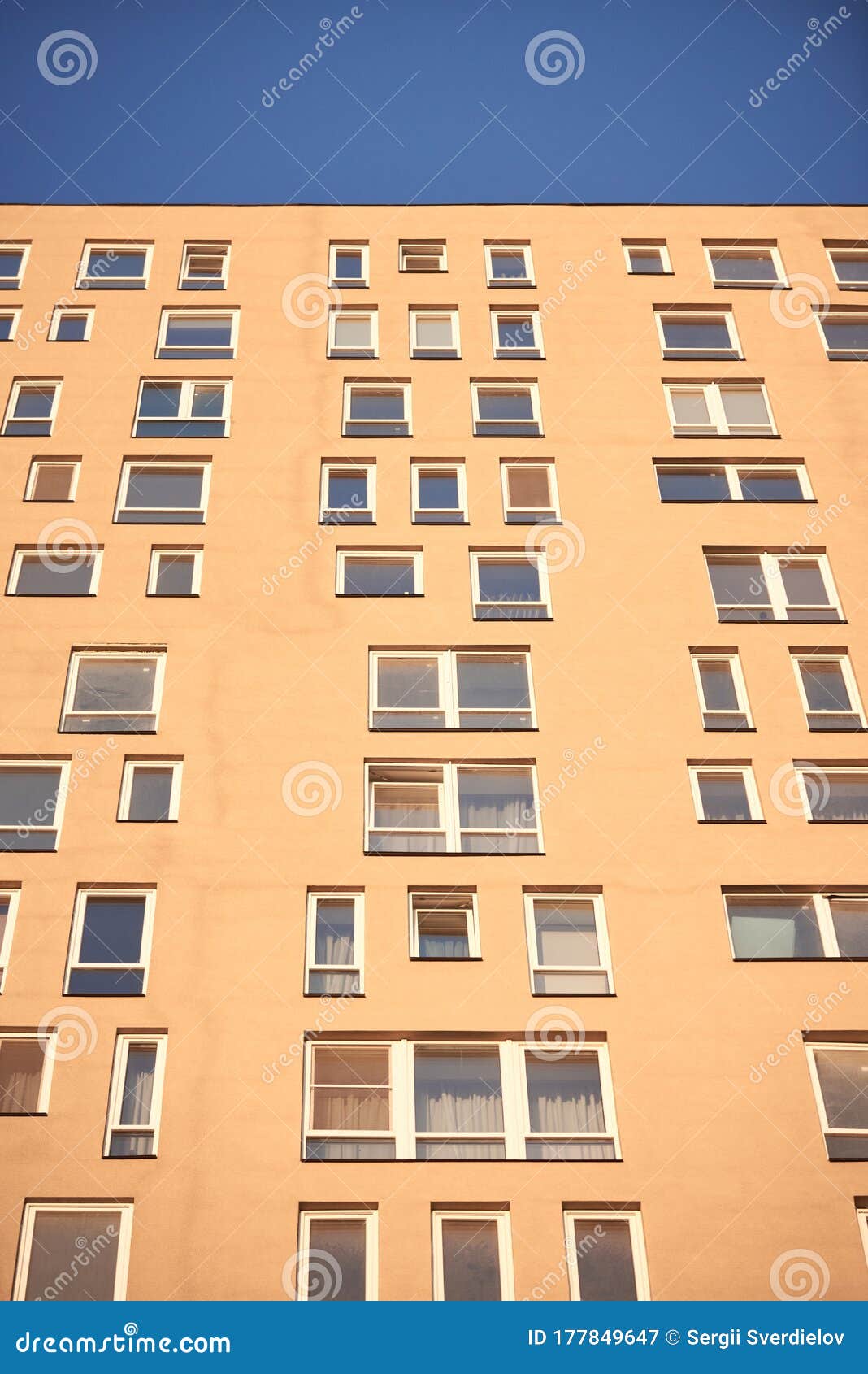 Windows on Yellow Flagstone Building Facade Stock Image - Image of ...