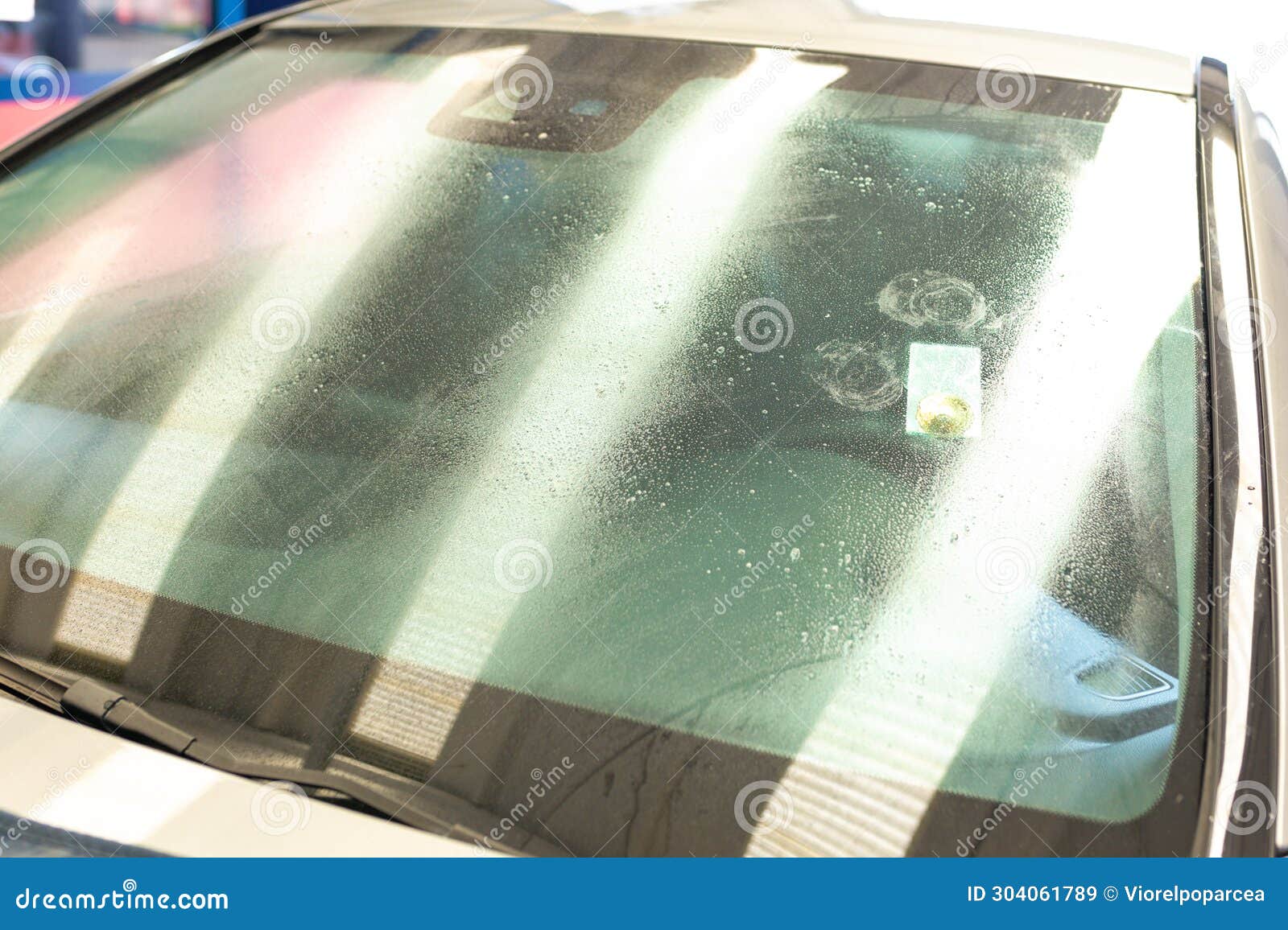 The Windshield of the Car in the Process of Being Washed, after the ...