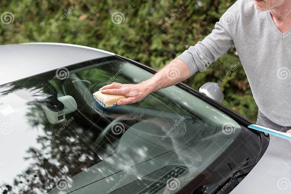 Windshield cleaning stock image. Image of windshield - 65015597