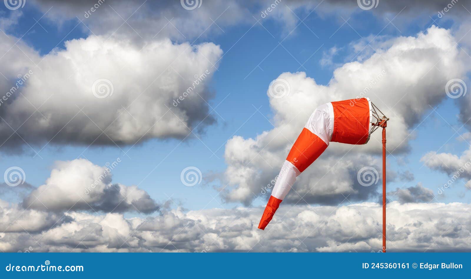 Windsock at an Airport with a Cloudy Sunny Sky in Background Stock ...