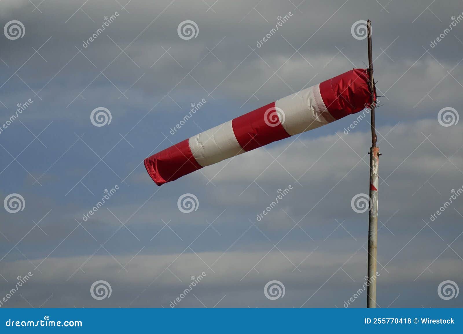 Windsock Blown By The Wind With Airplane On A Background Royalty-Free ...