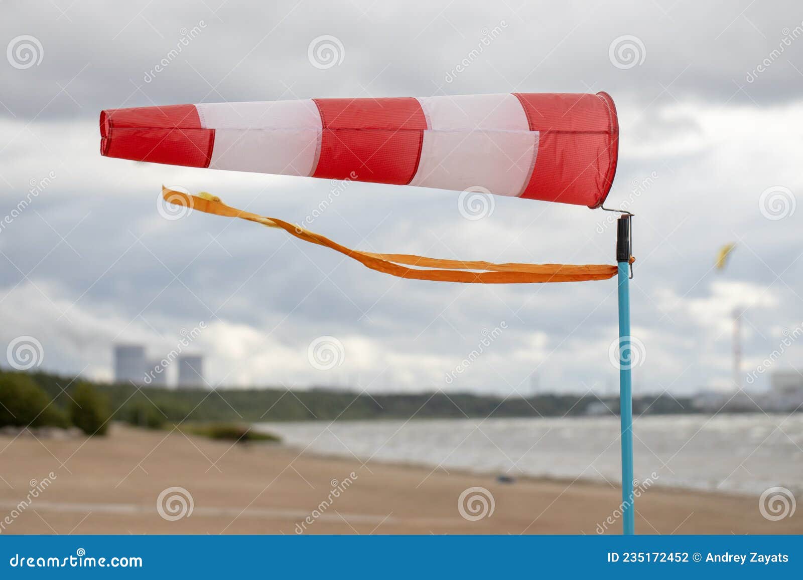 Windsock on a Sandy Beach in Strong Wind, Red and White Fabric Cone ...