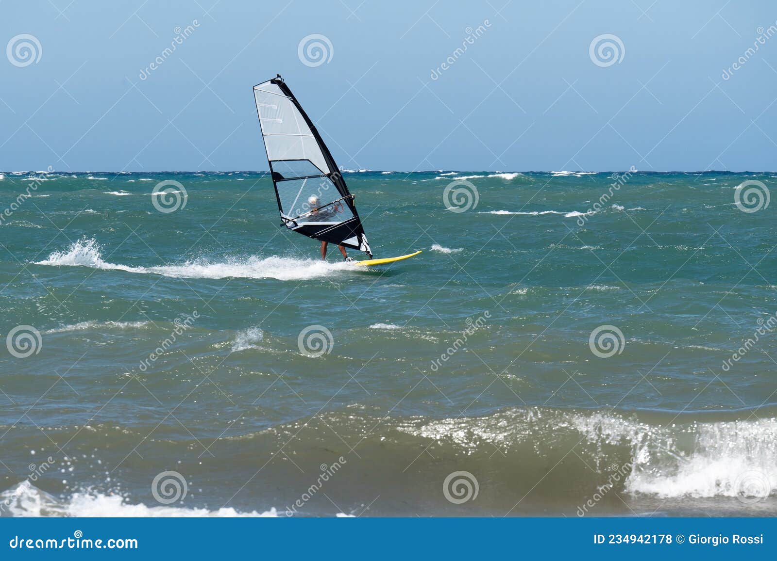 Windsurf Riding the Waves in a Choppy Sea Editorial Stock Photo - Image ...