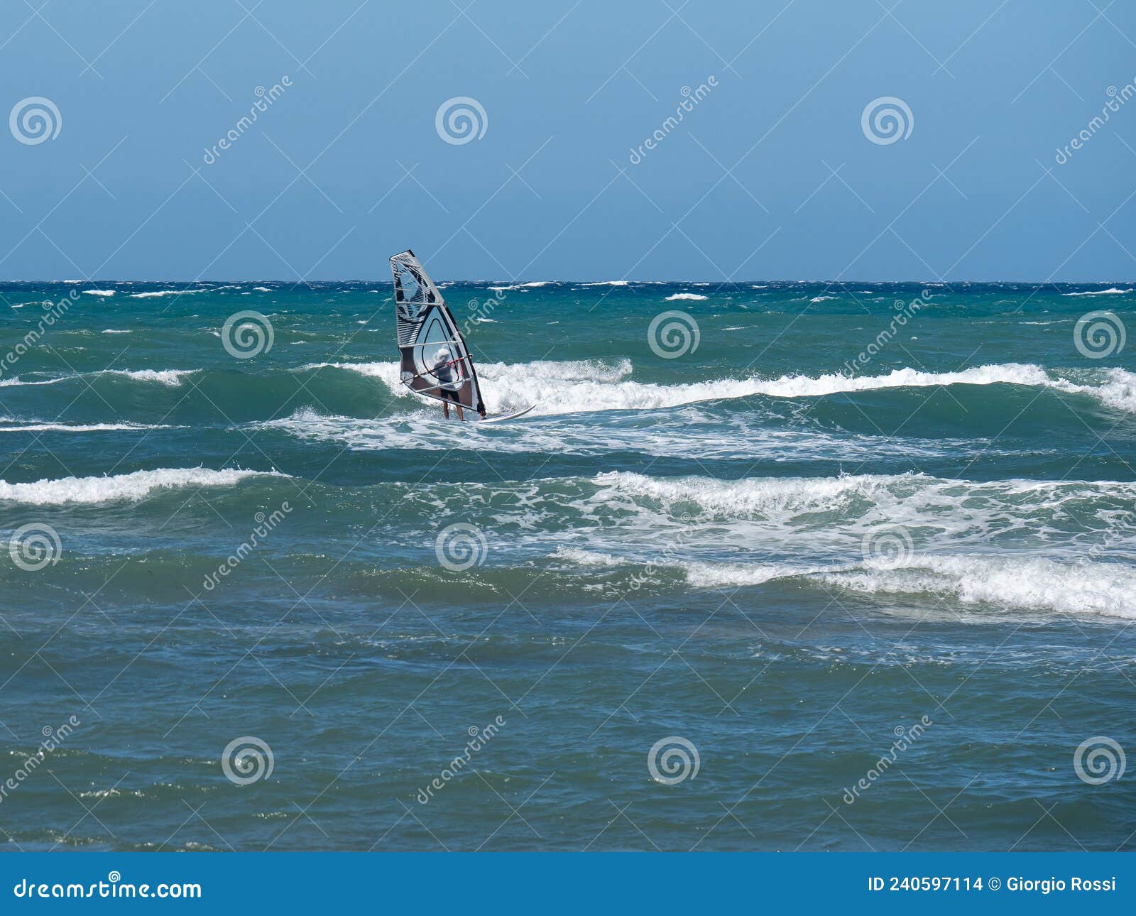Windsurf Riding the Waves in a Choppy Sea Stock Photo - Image of nature ...