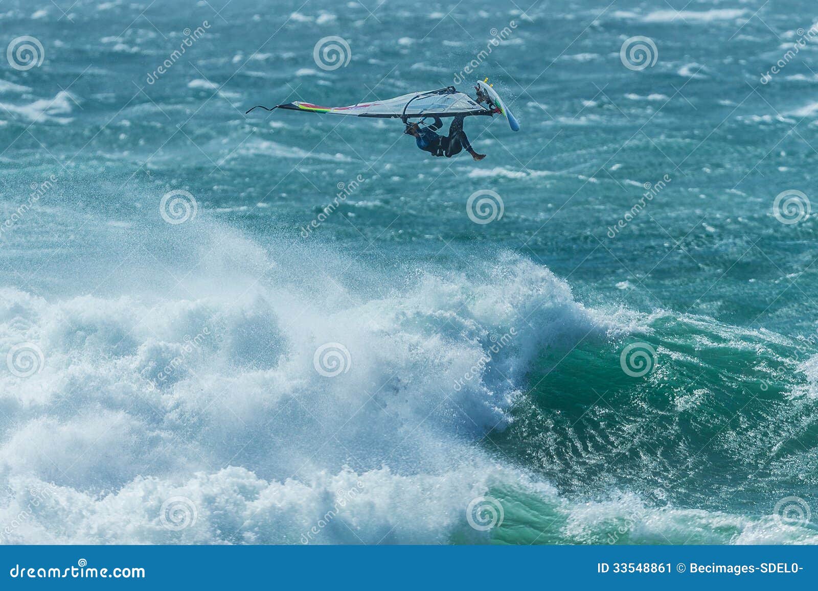 Windsurf Wave Jump Falling stock image. Image of female - 33548861
