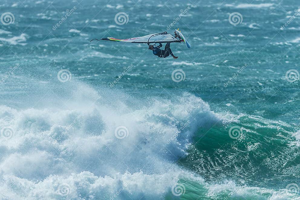 Windsurf Wave Jump Falling stock image. Image of female - 33548861