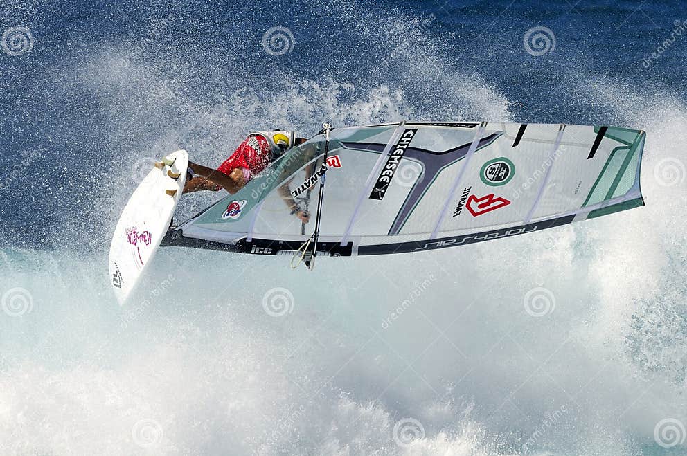Windsurfer flying on wave editorial photography. Image of windsurfer ...