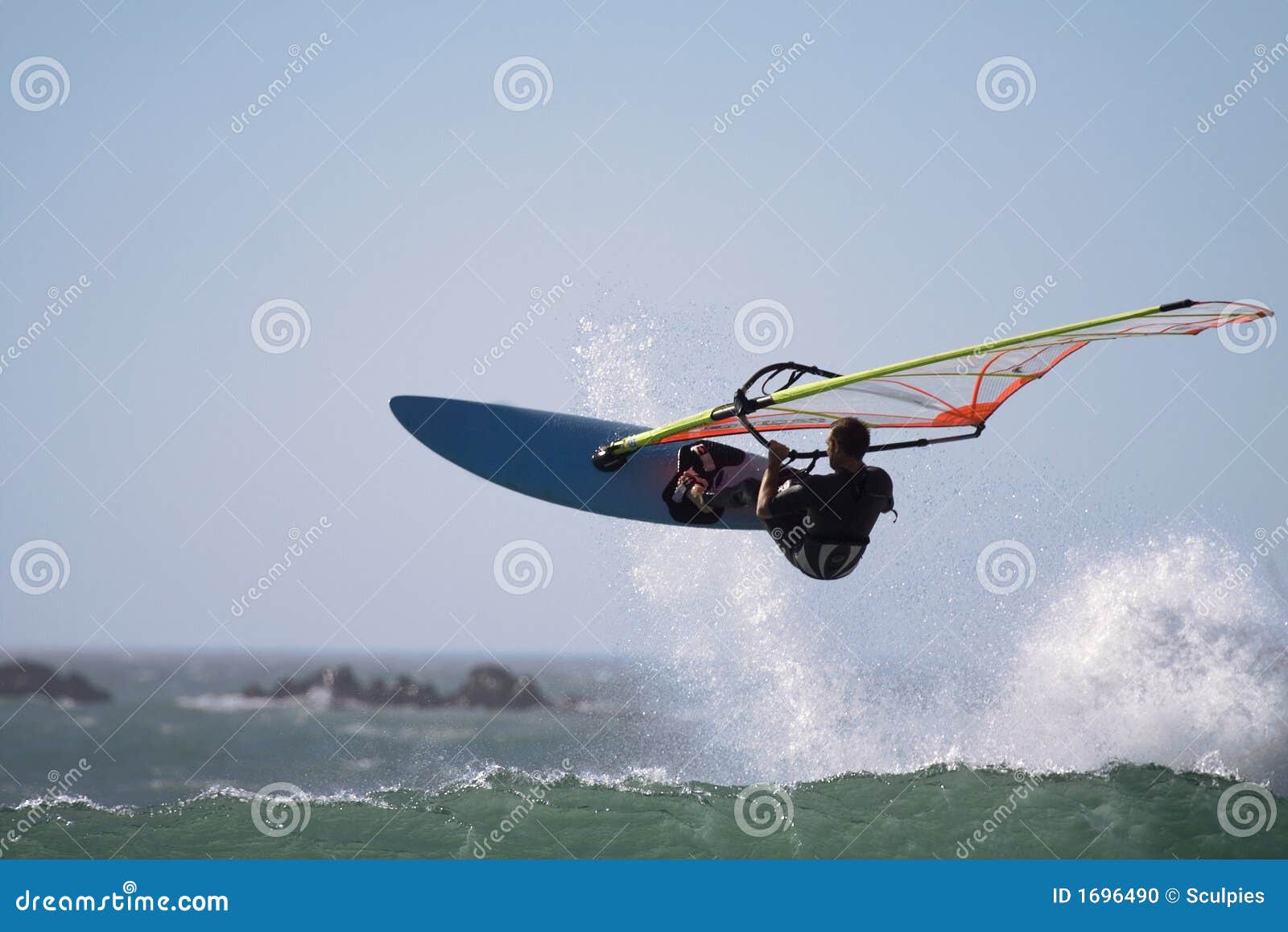 Windsurfer jump stock photo. Image of windsurfer, windsurfing - 1696490
