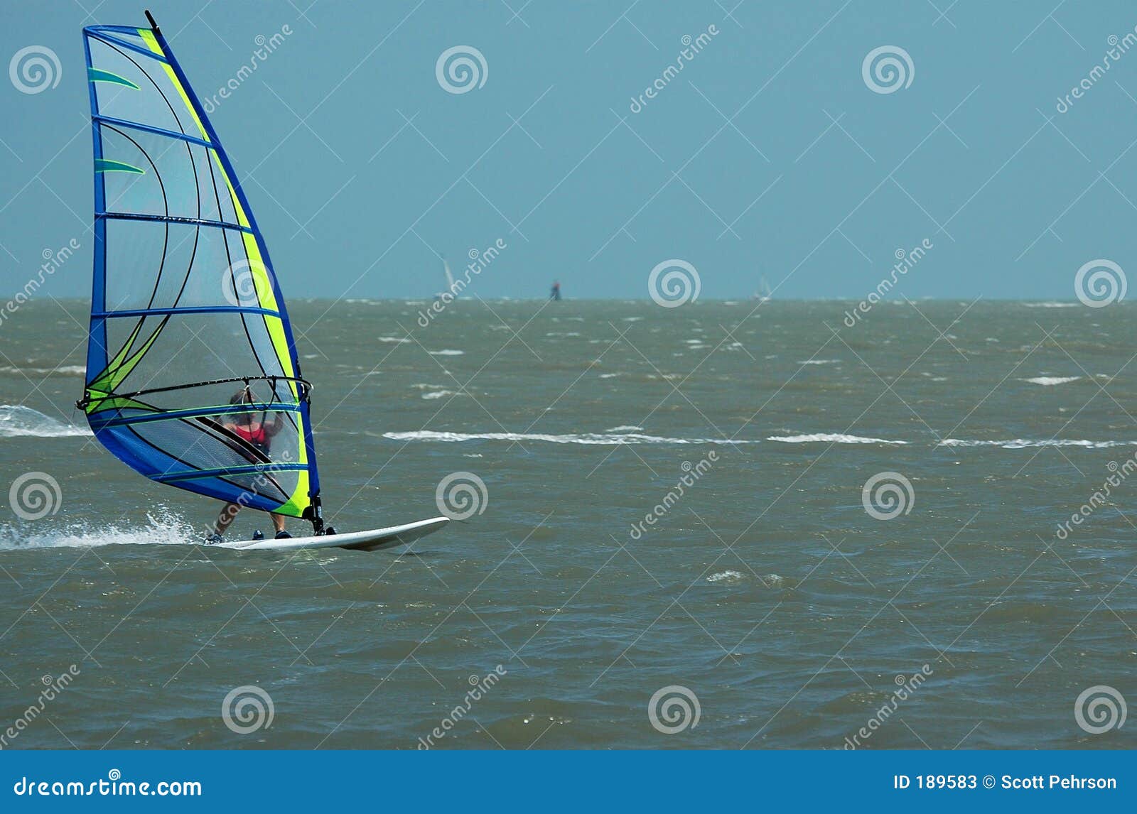 Windsurfer and sailboat II stock image. Image of sports - 189583