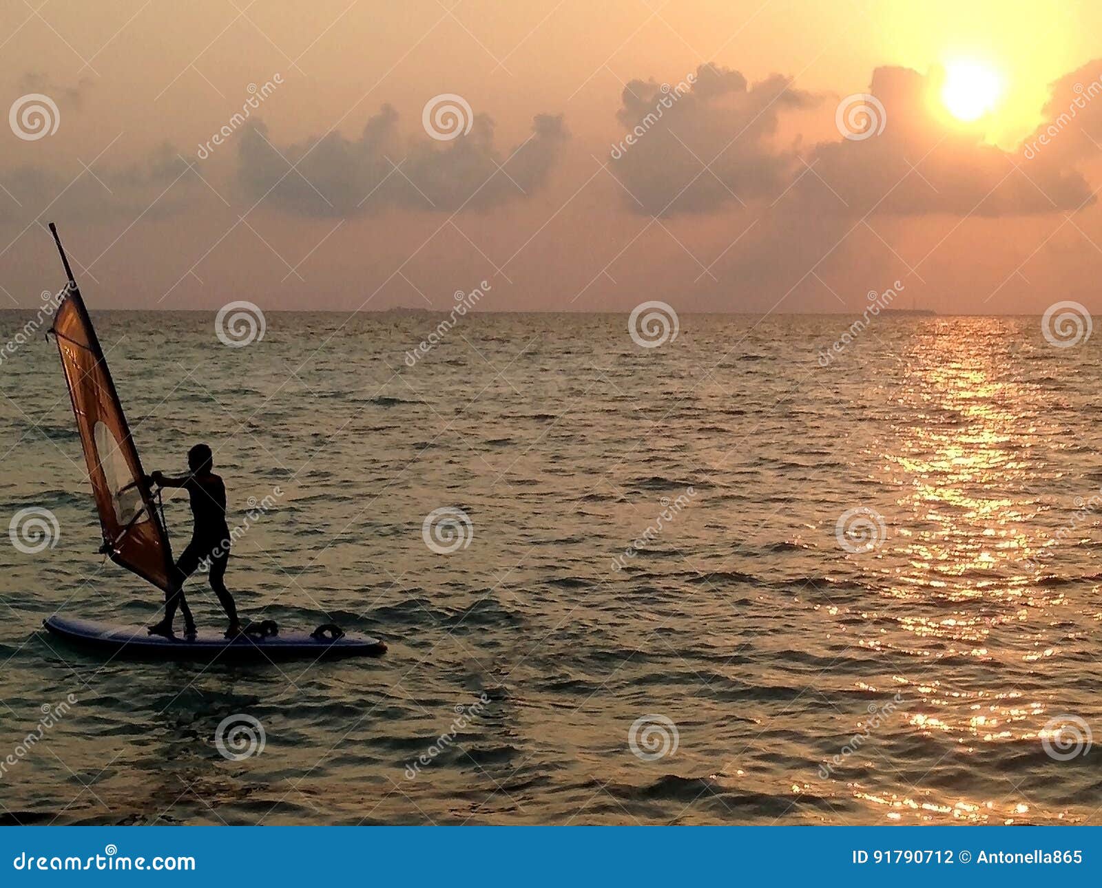 Windsurfer at the sunset editorial photography. Image of windsurf ...