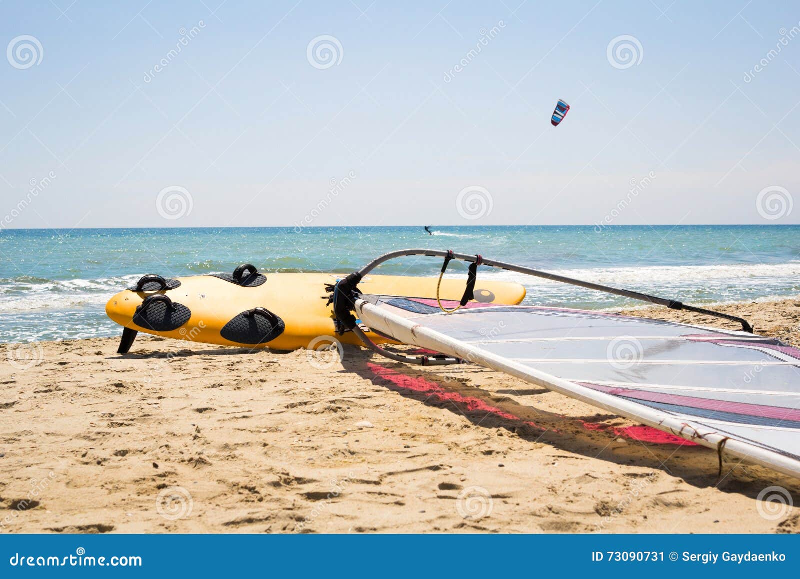 Windsurfing Board with Sail Lying on the Sand Stock Image - Image of ...