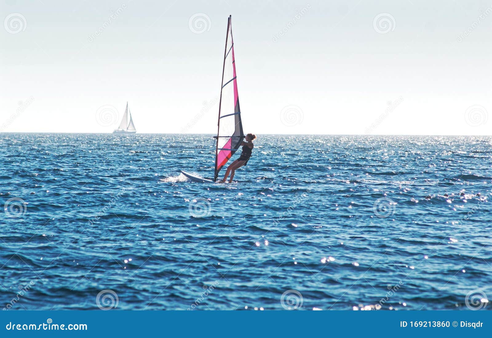 Windsurfing in Sunset on the Sea Stock Photo - Image of outdoor, ocean ...