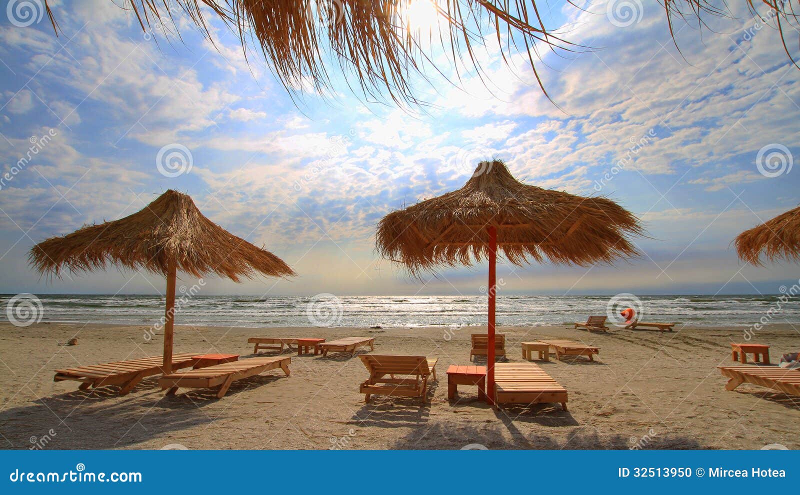 Windy beach stock photo. Image of sunshade, longue, sand - 32513950