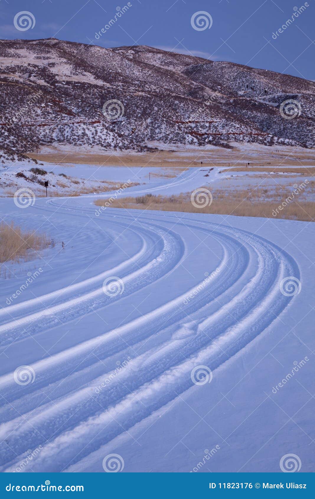 Windy Country Road Covered by Snow Stock Photo - Image of rock, winter ...