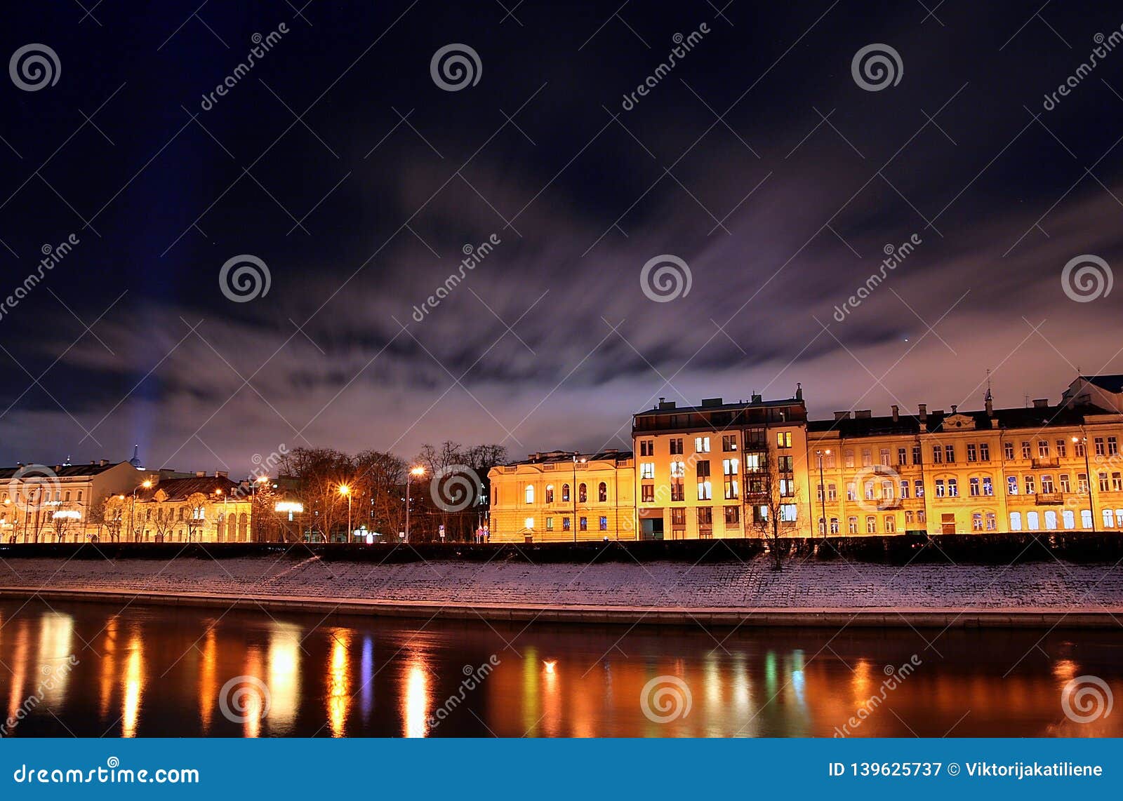 Windy night in a city stock image. Image of lights, cityscape - 139625737