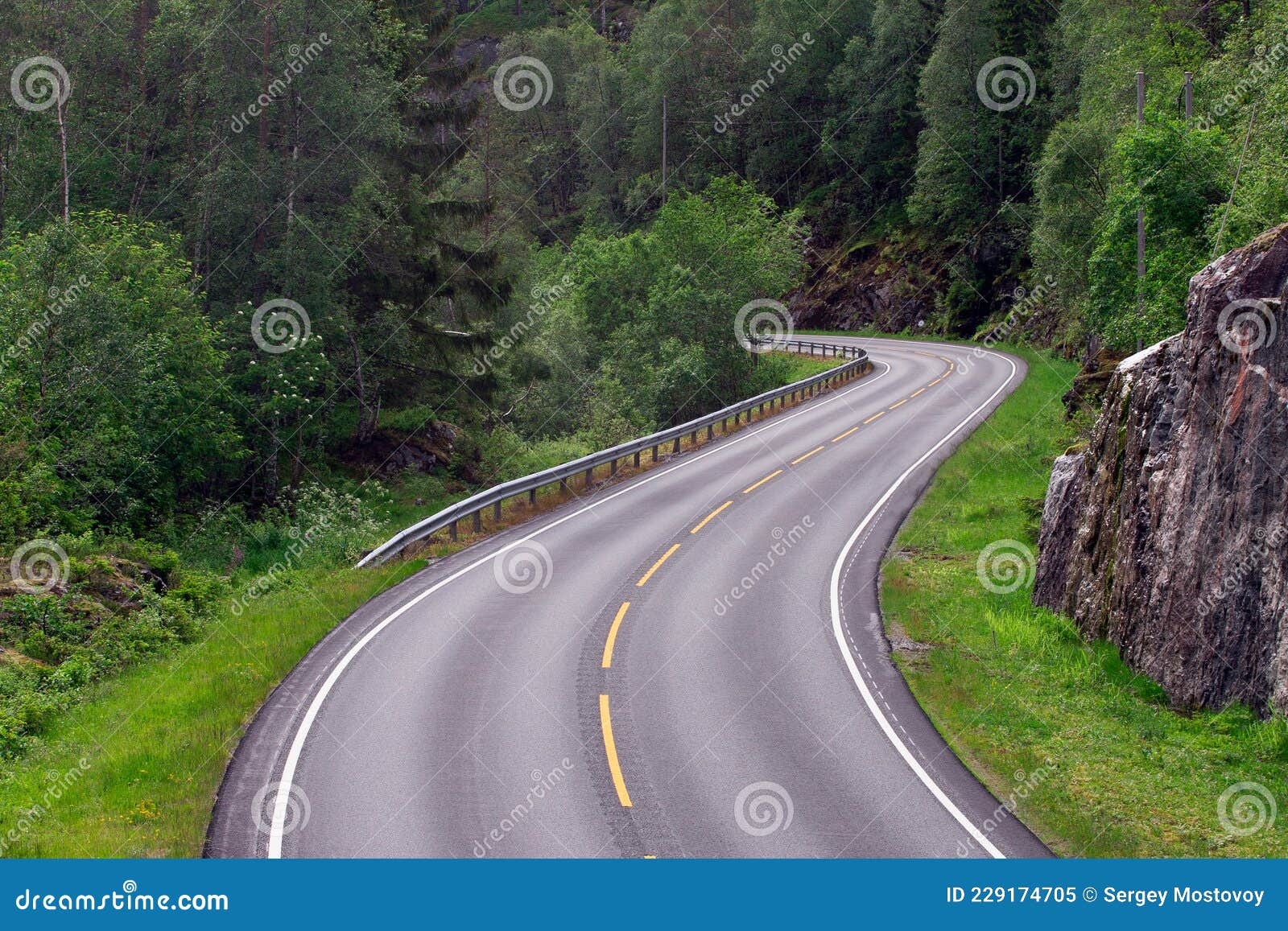A windy road stock image. Image of green, roadway, nature - 229174705