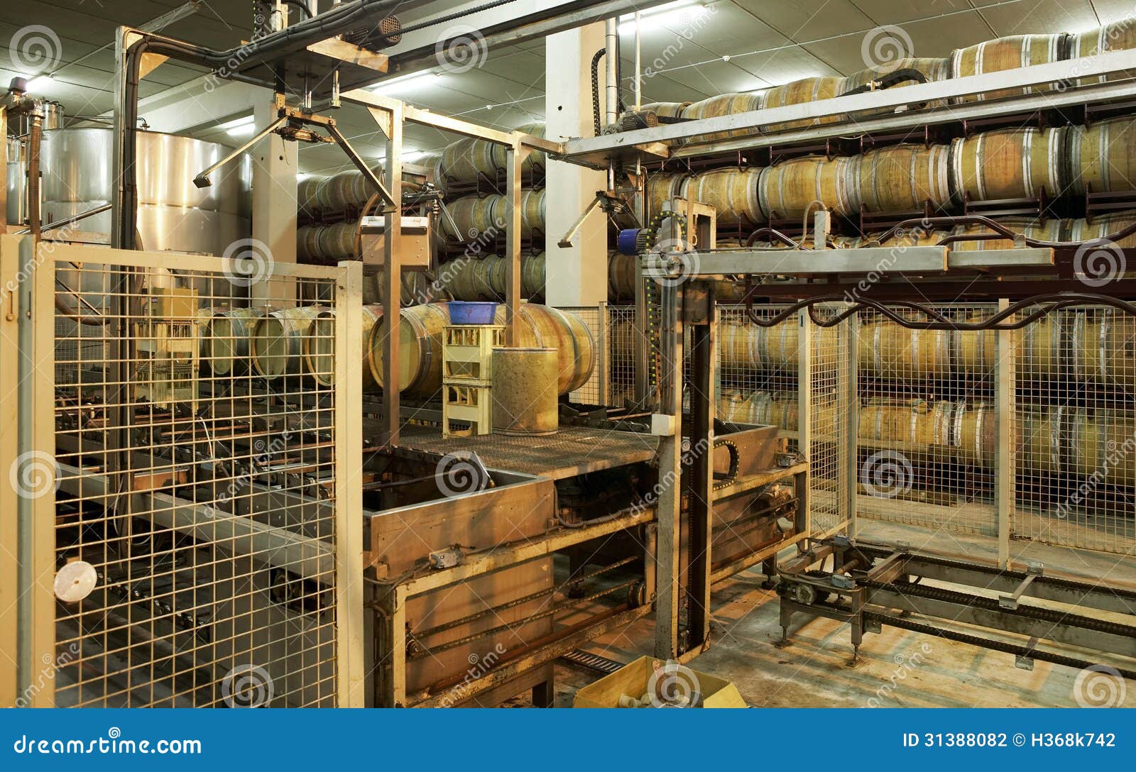 Wine Barrels in a Filling Process Stock Photo - Image of process ...