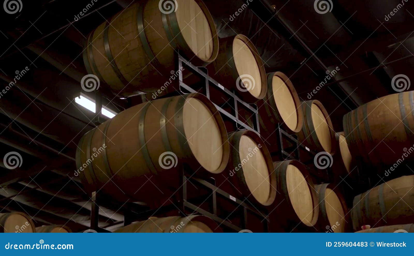 Wine Barrels on a Rack Inside a Production Facility in a Celler Stock ...