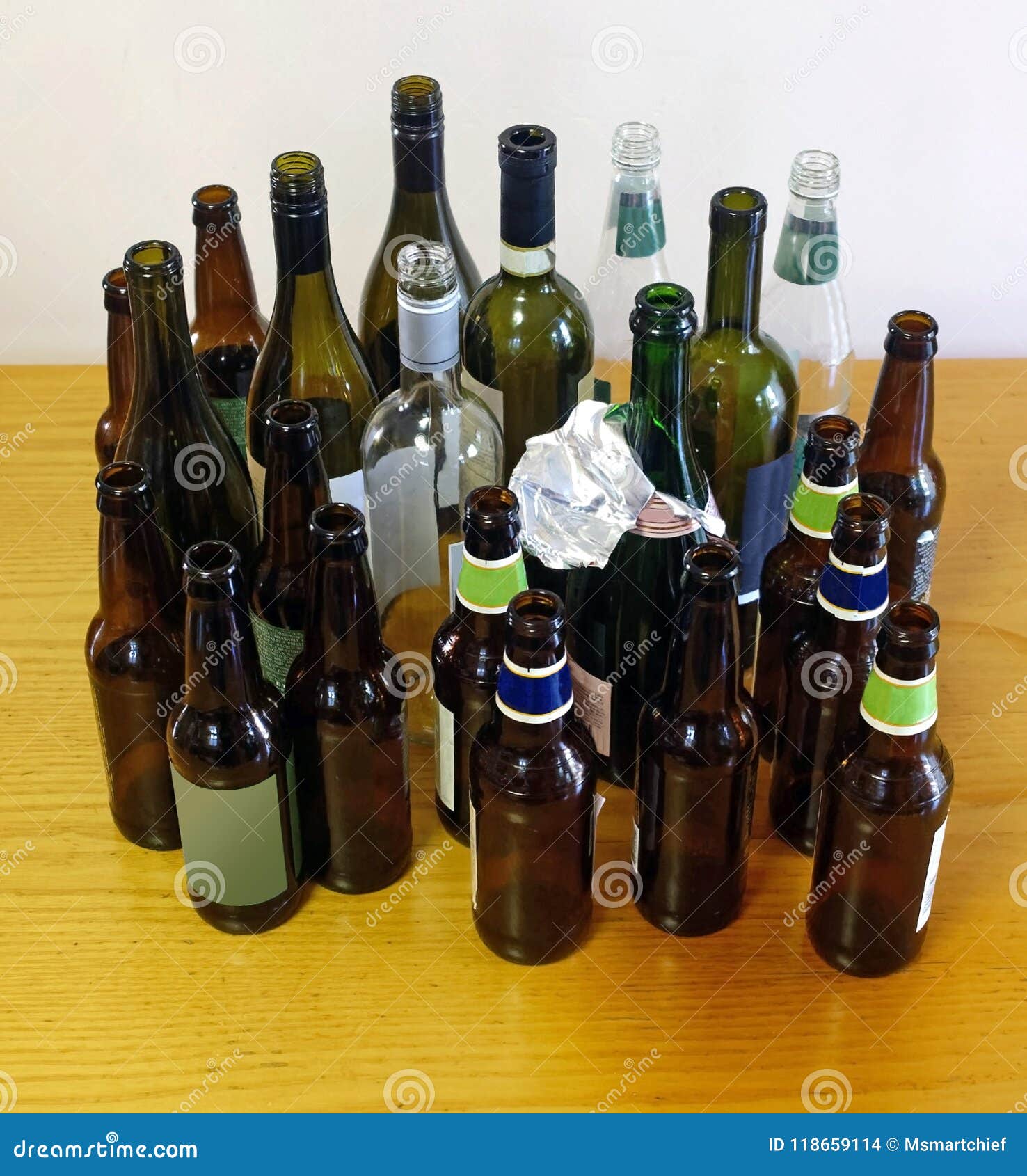 Wine and Beer Bottles on Table Stock Photo - Image of bottles, beverage ...