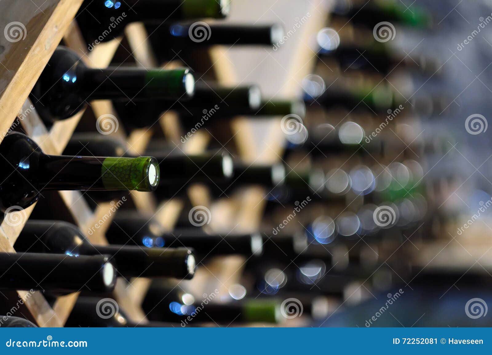 Wine Bottles Stacked on Wooden Racks Stock Image - Image of drink ...
