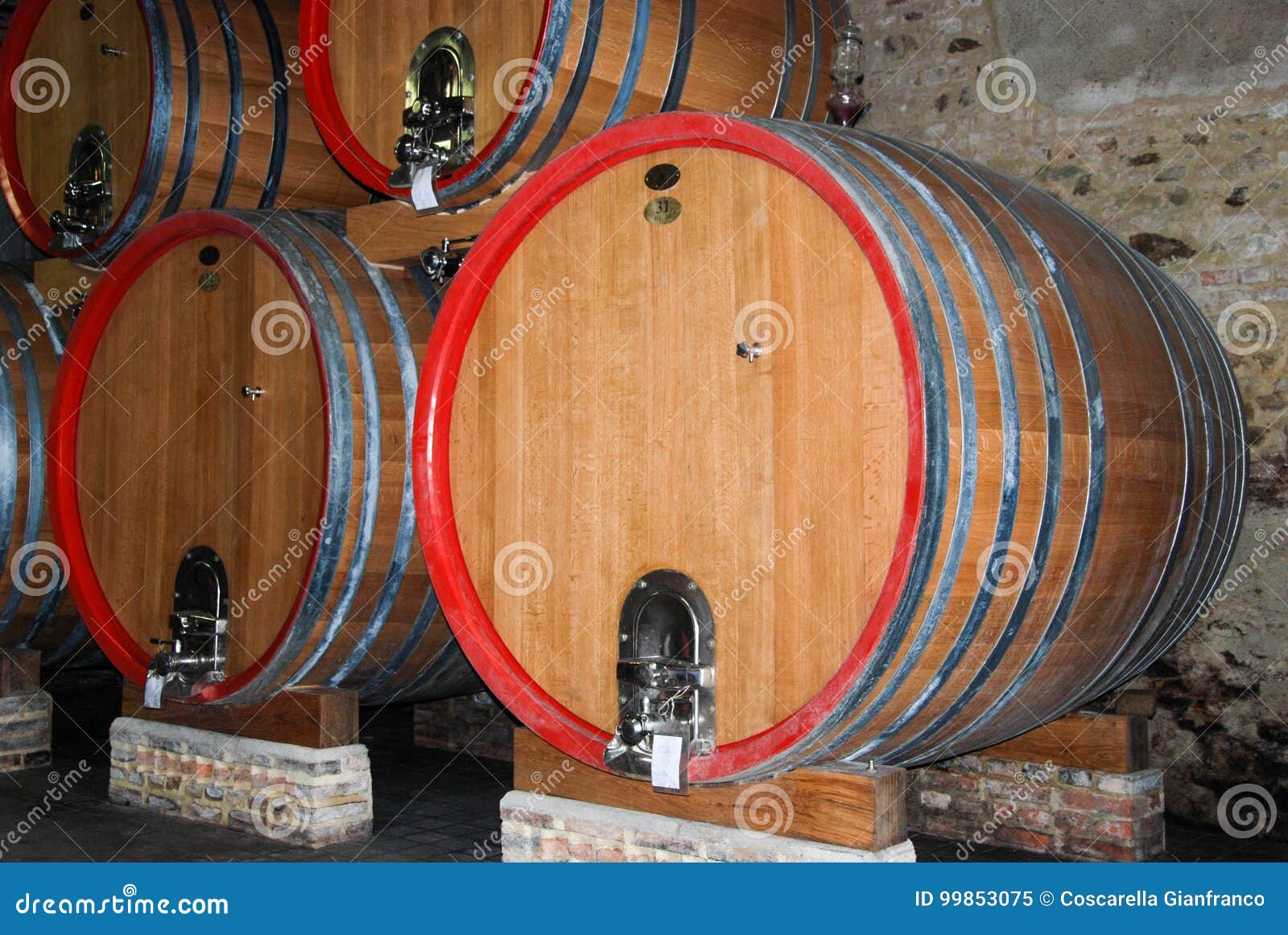 Barrels in a wine cellar stock image. Image of barrels - 99853075