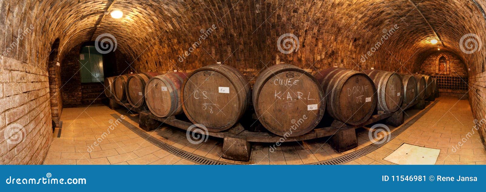 Old Wine Cellar With Big And Small Wooden Barrels For Traditional ...