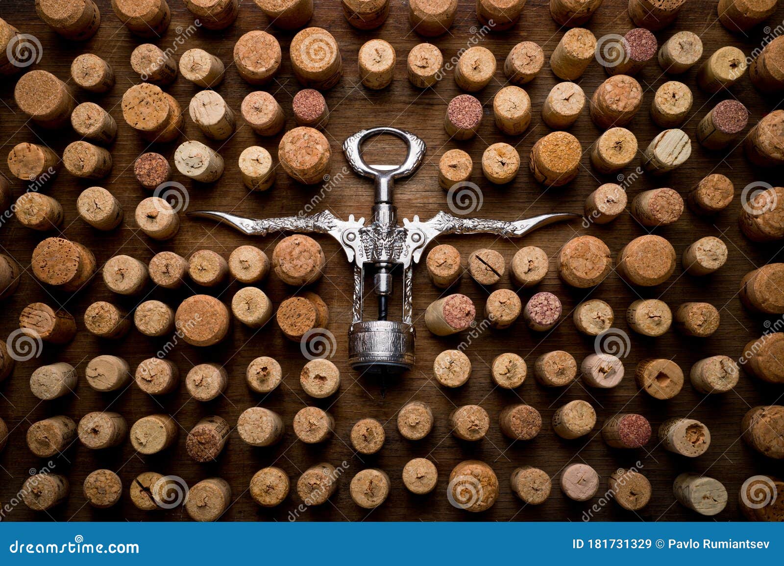 Wine Corks of Different Sizes and a Corkscrew Standing Upright on an ...