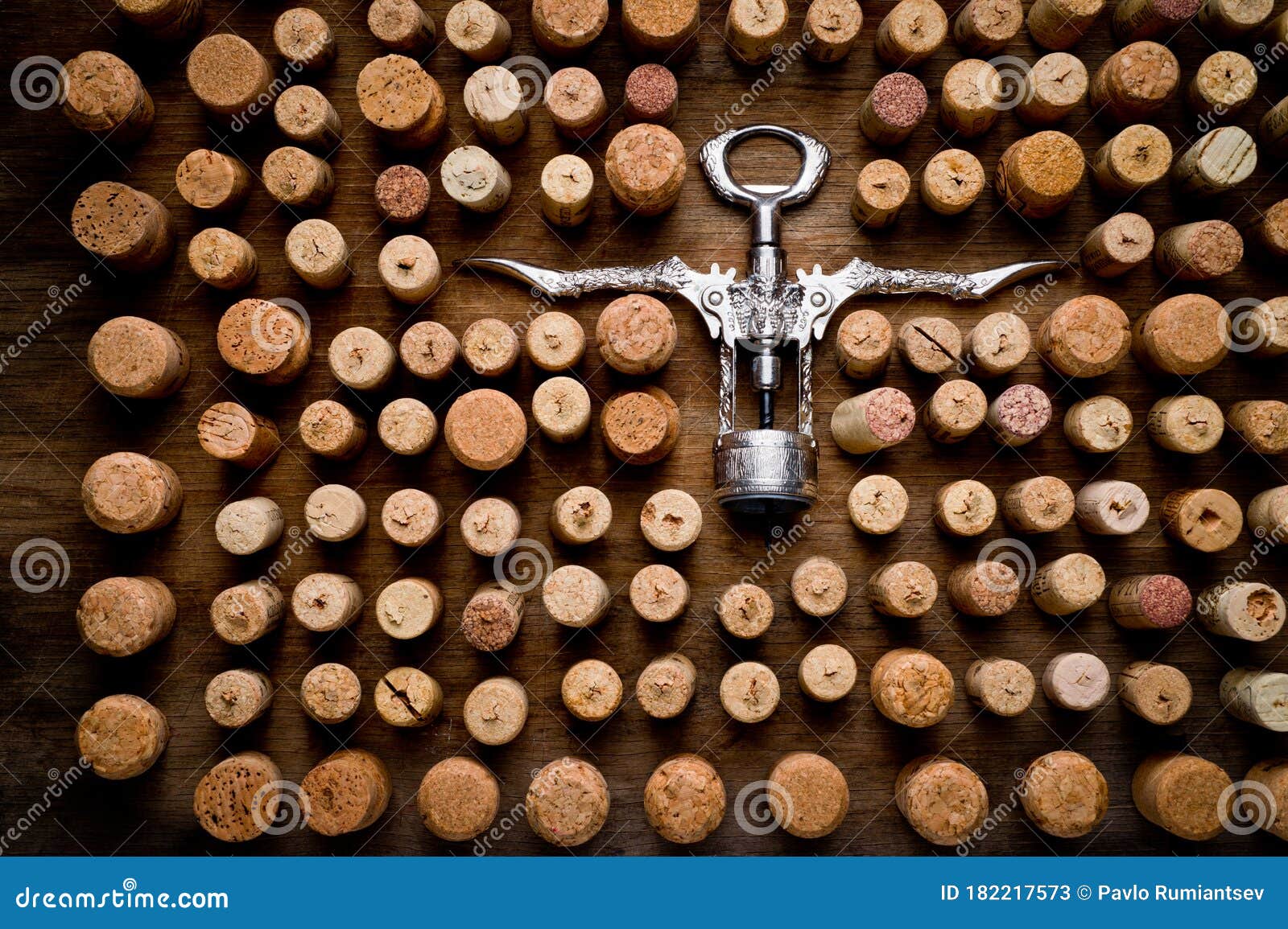 Wine Corks of Different Sizes and a Corkscrew Standing Upright on an ...