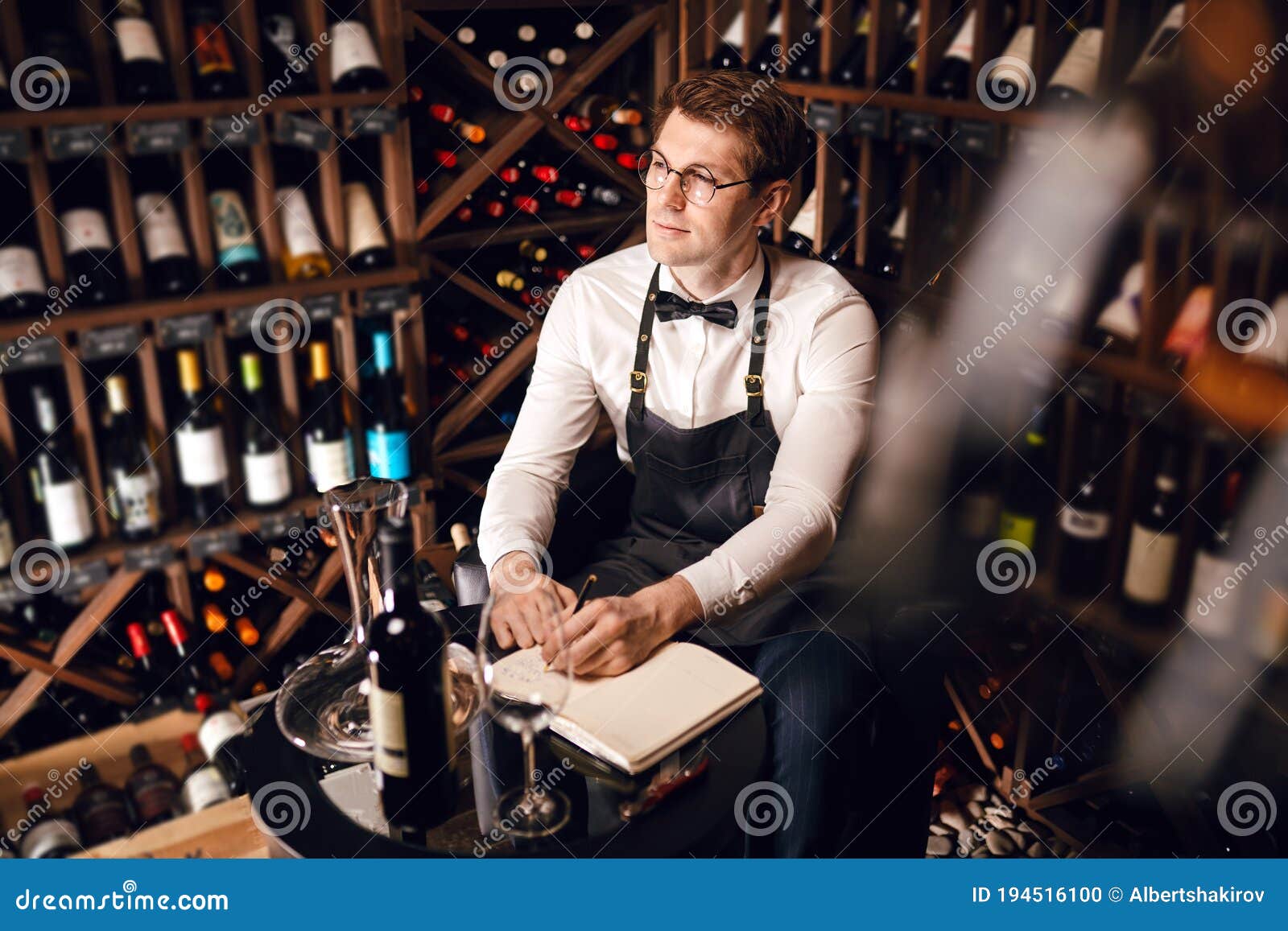 Wine Taster Writing in Notepad Information of Wine Origin and Taste ...