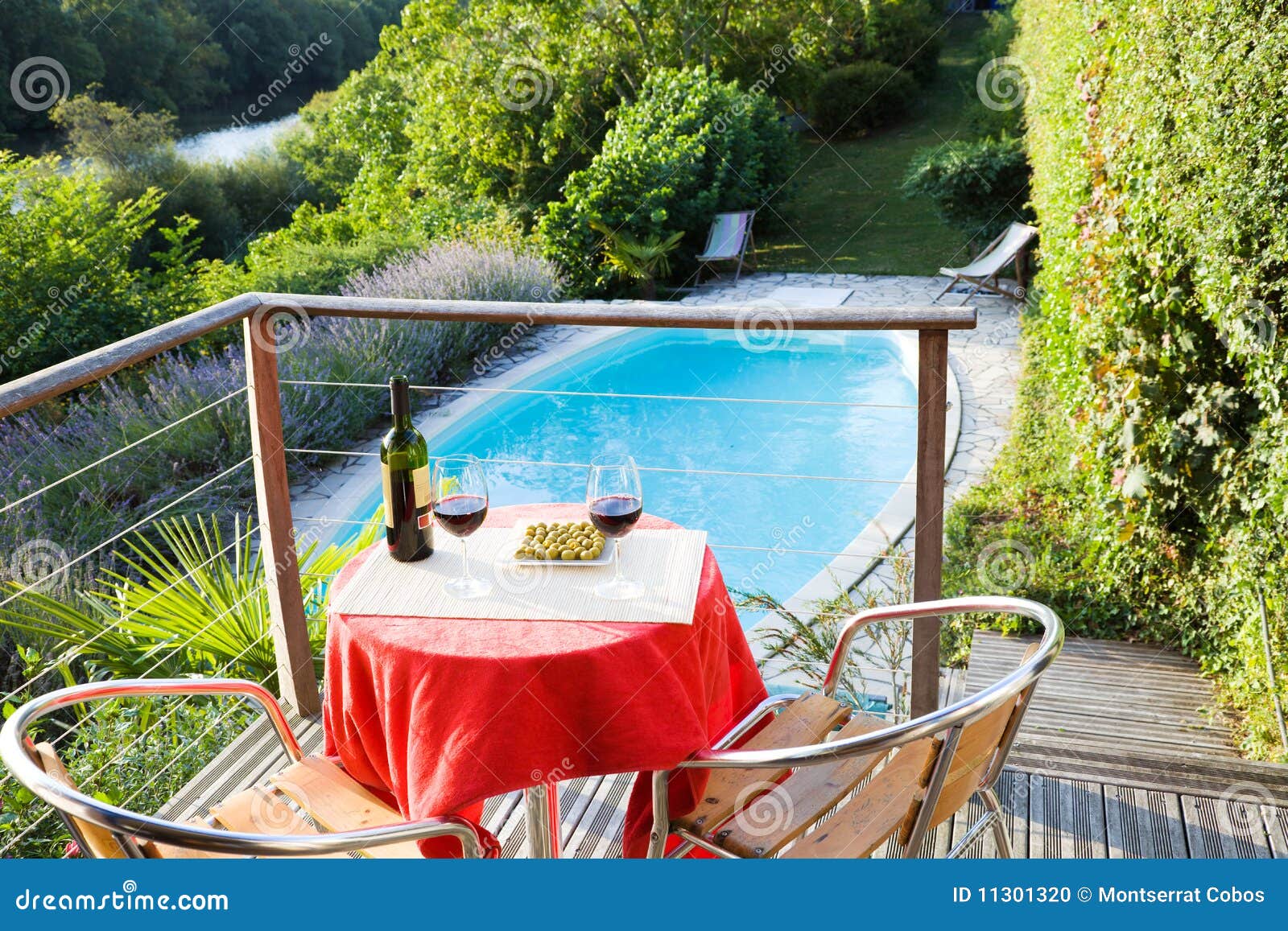 Wine glasses at the pool stock photo. Image of blue, furniture - 11301320