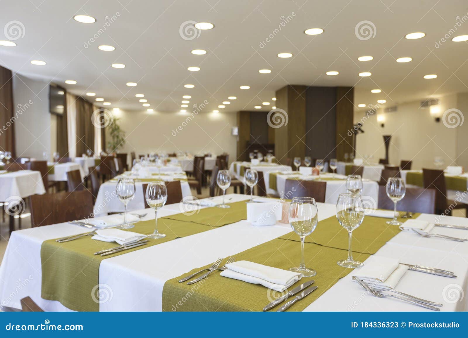 Wine Glasses on Table in Restaurant with Columns Stock Image - Image of ...
